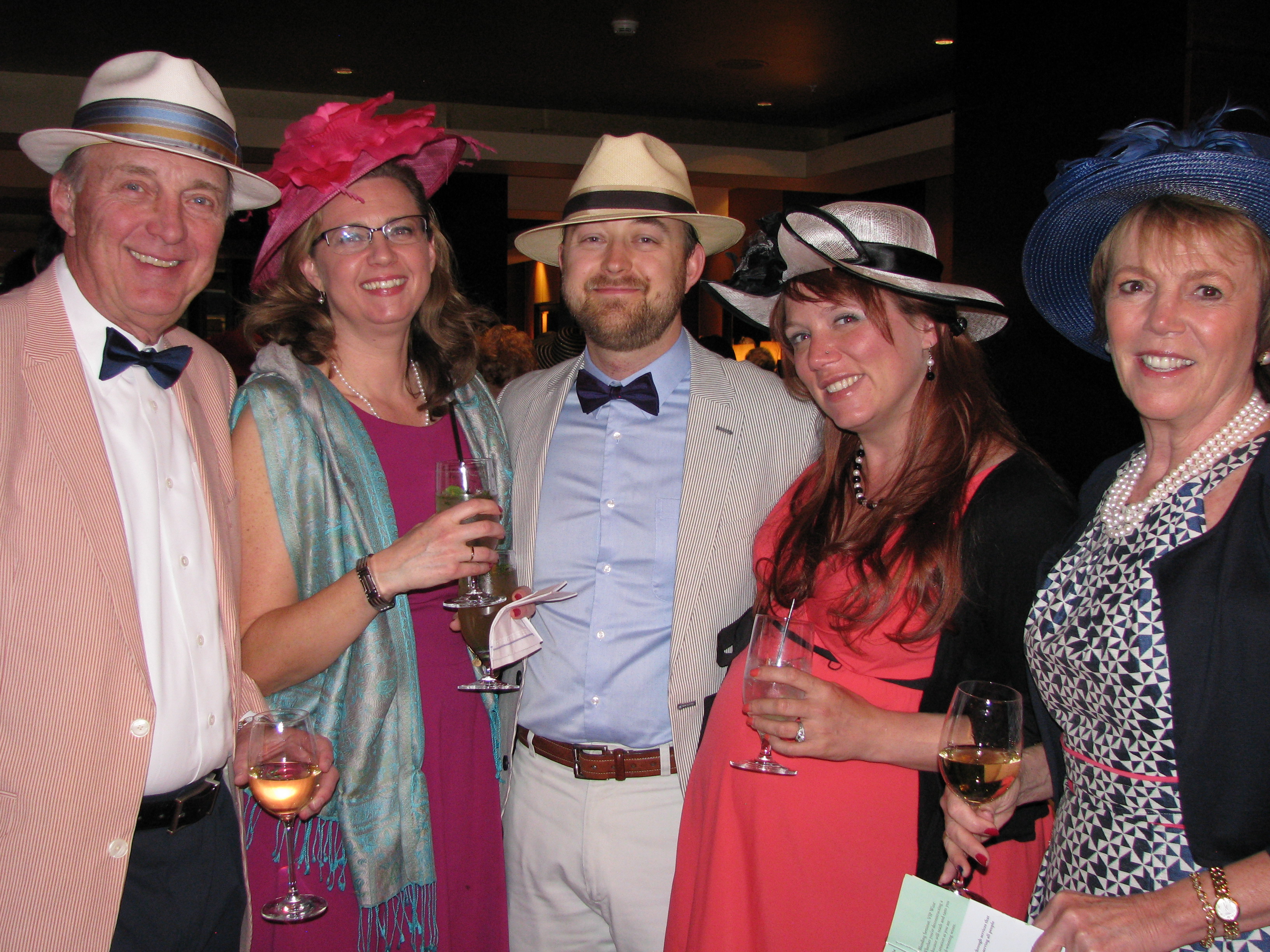 Showing off sporty Derby attire: Mike Porter, left, Amy Bentz, Andrew ...