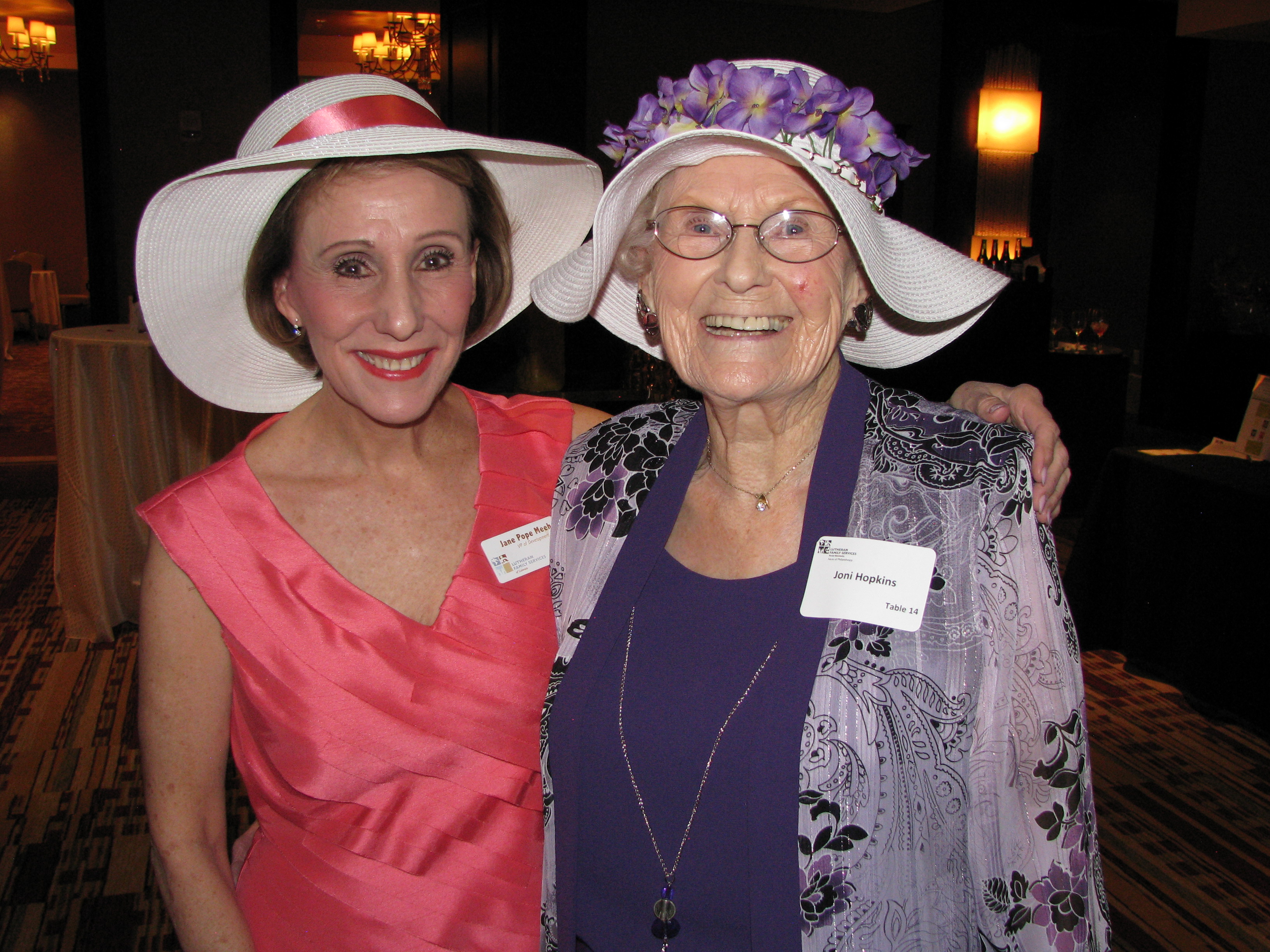 Jane Pope Meehan, left, smiles with Joni Hopkins