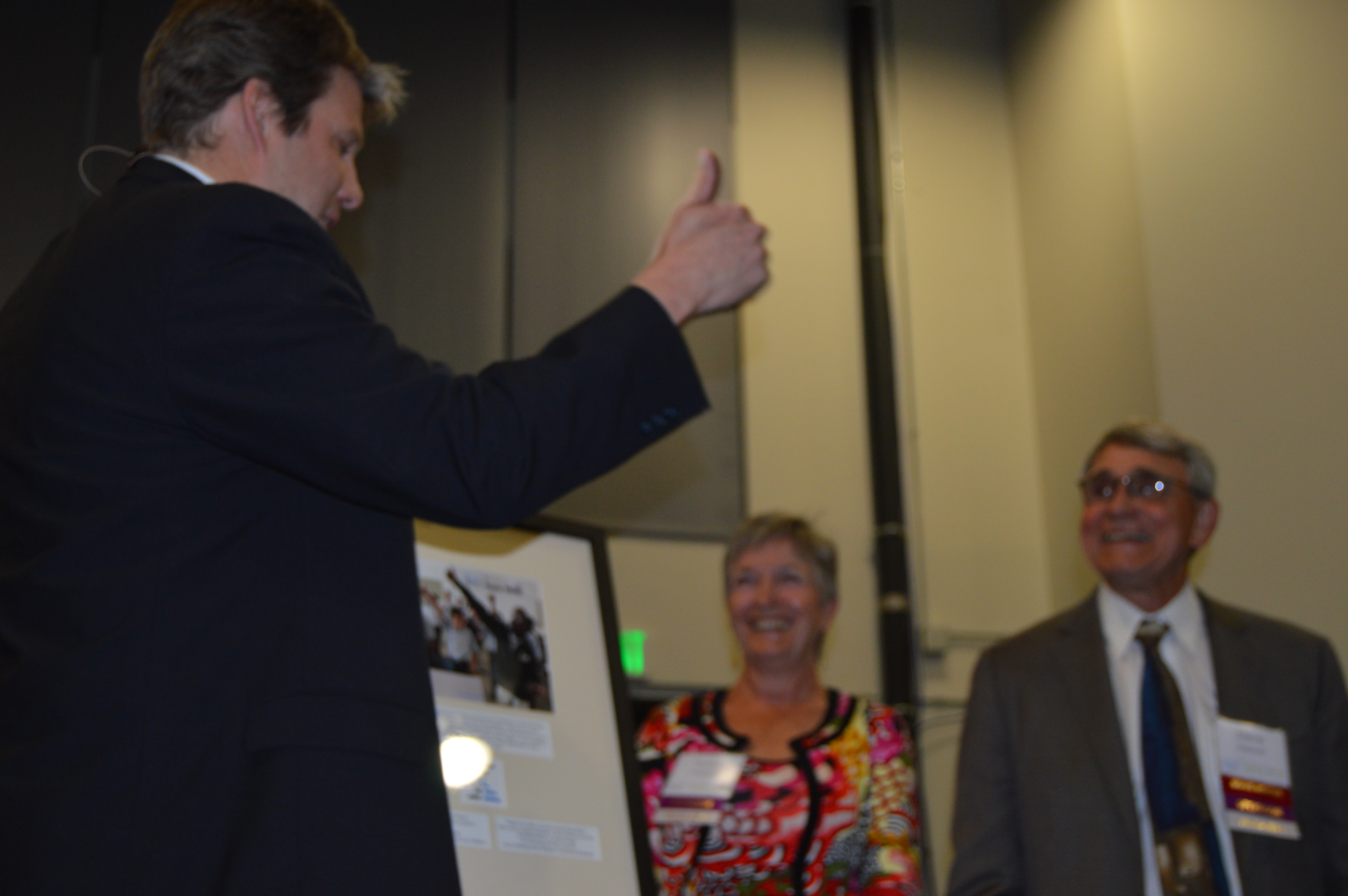 CEO Bill Kurtz gives a thumb's up for the outstanding contributions of ...