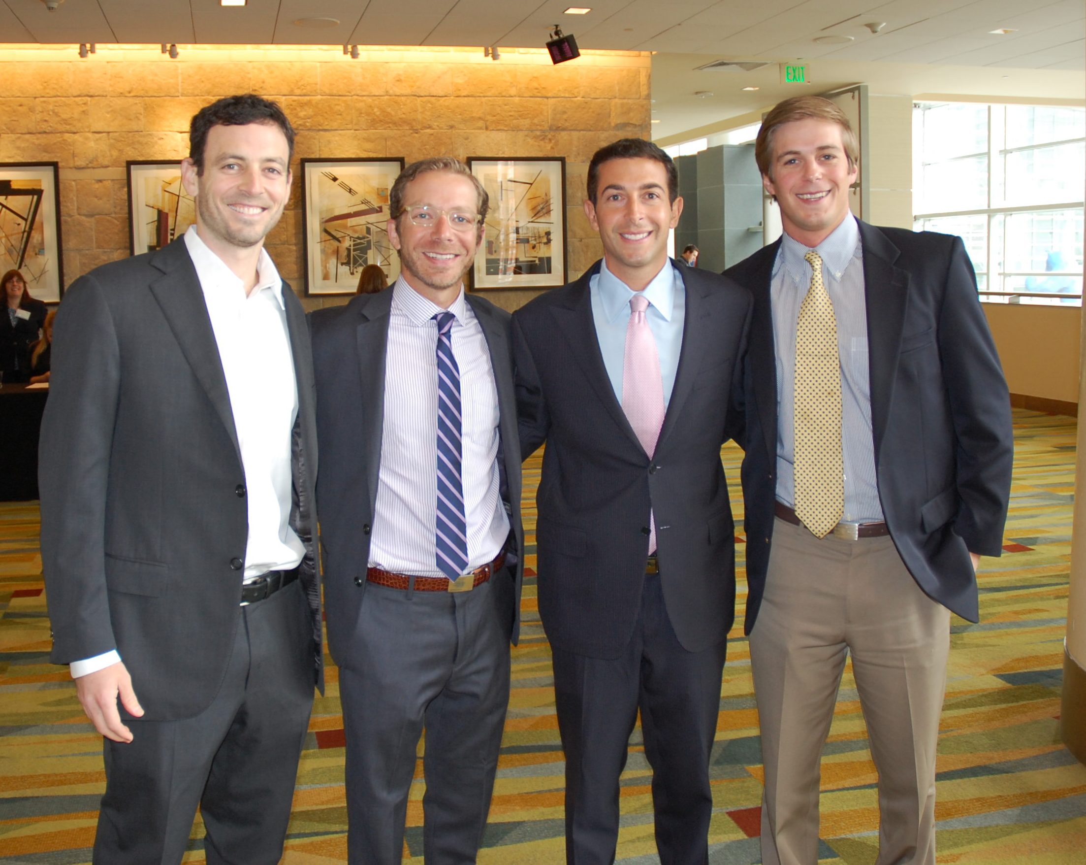 Daniel Sturman, left, Matt Weiss, Sam Zaitz (one of the event co-chairs ...
