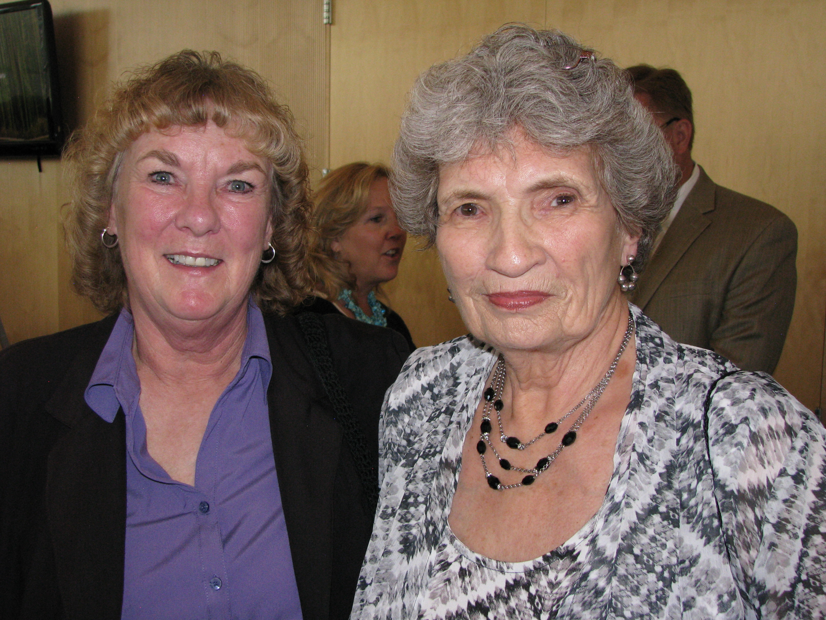 Jo Ann McKie, left, catches up with Nancy Bohlen
