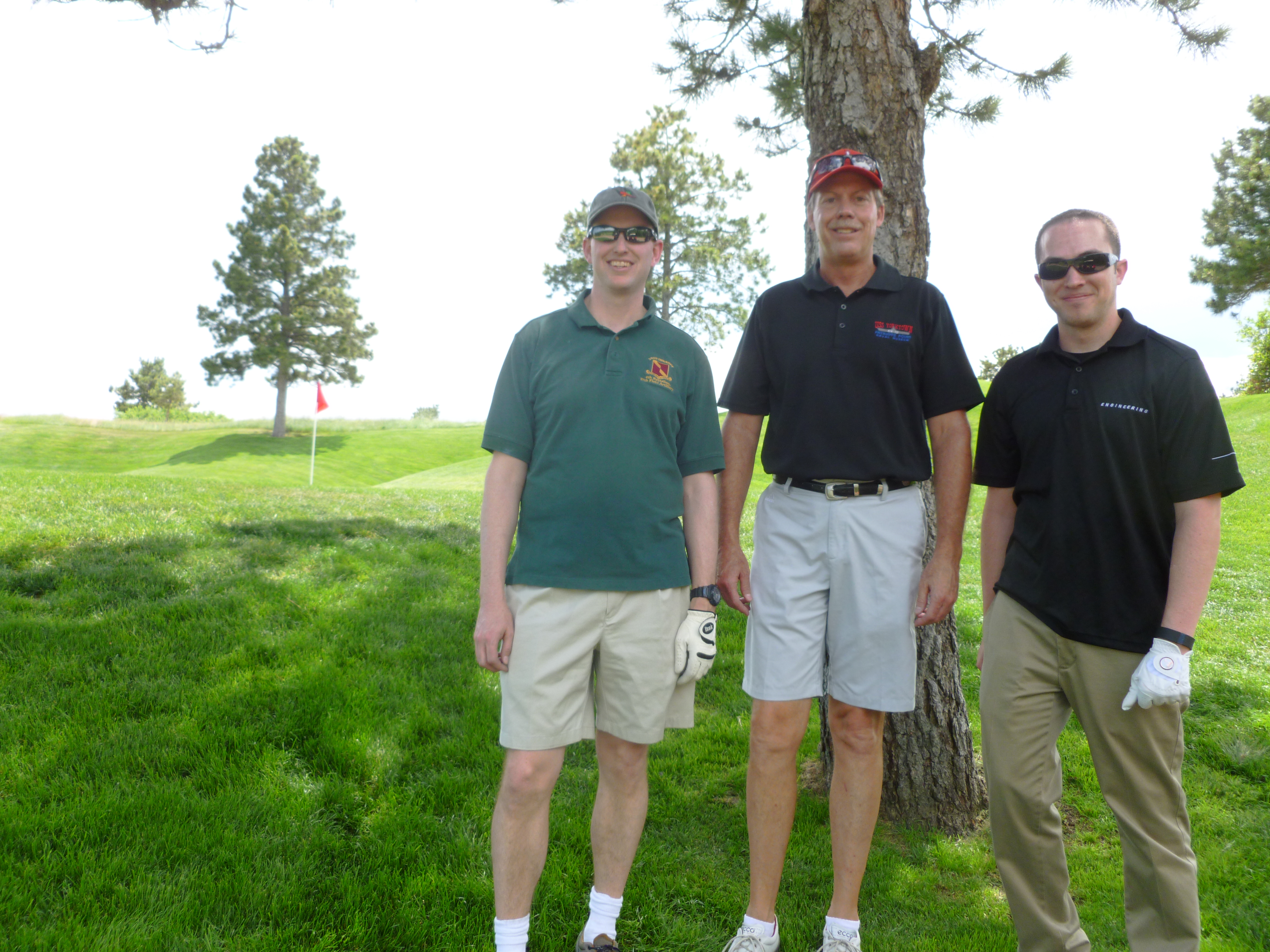Finishing their putts (l to r): Sean Vogel, David Bourchier and Evan Rossi