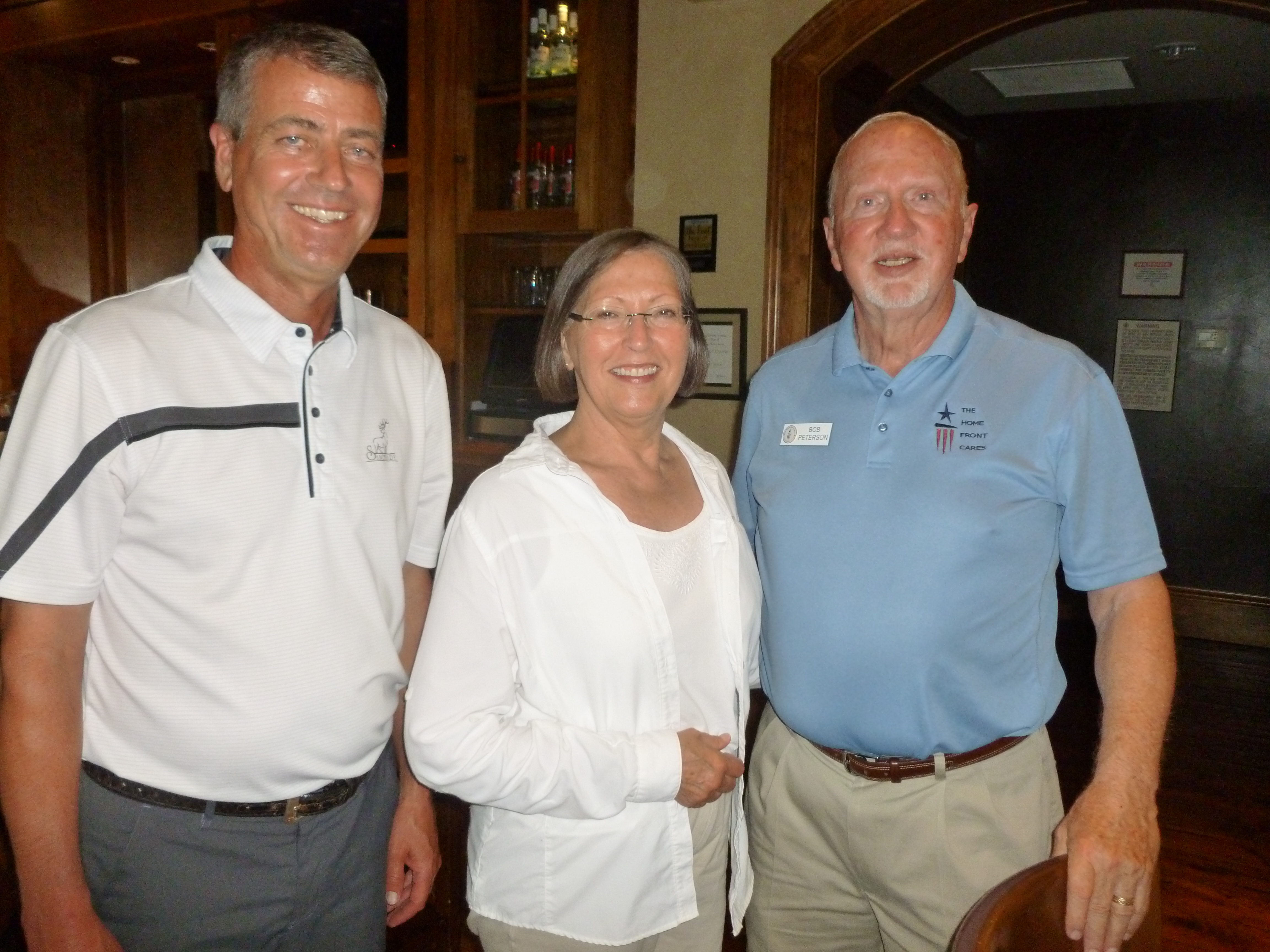 Sanctuary's head pro Rudy Zupetz (left) with Susie and golf chair Bob ...