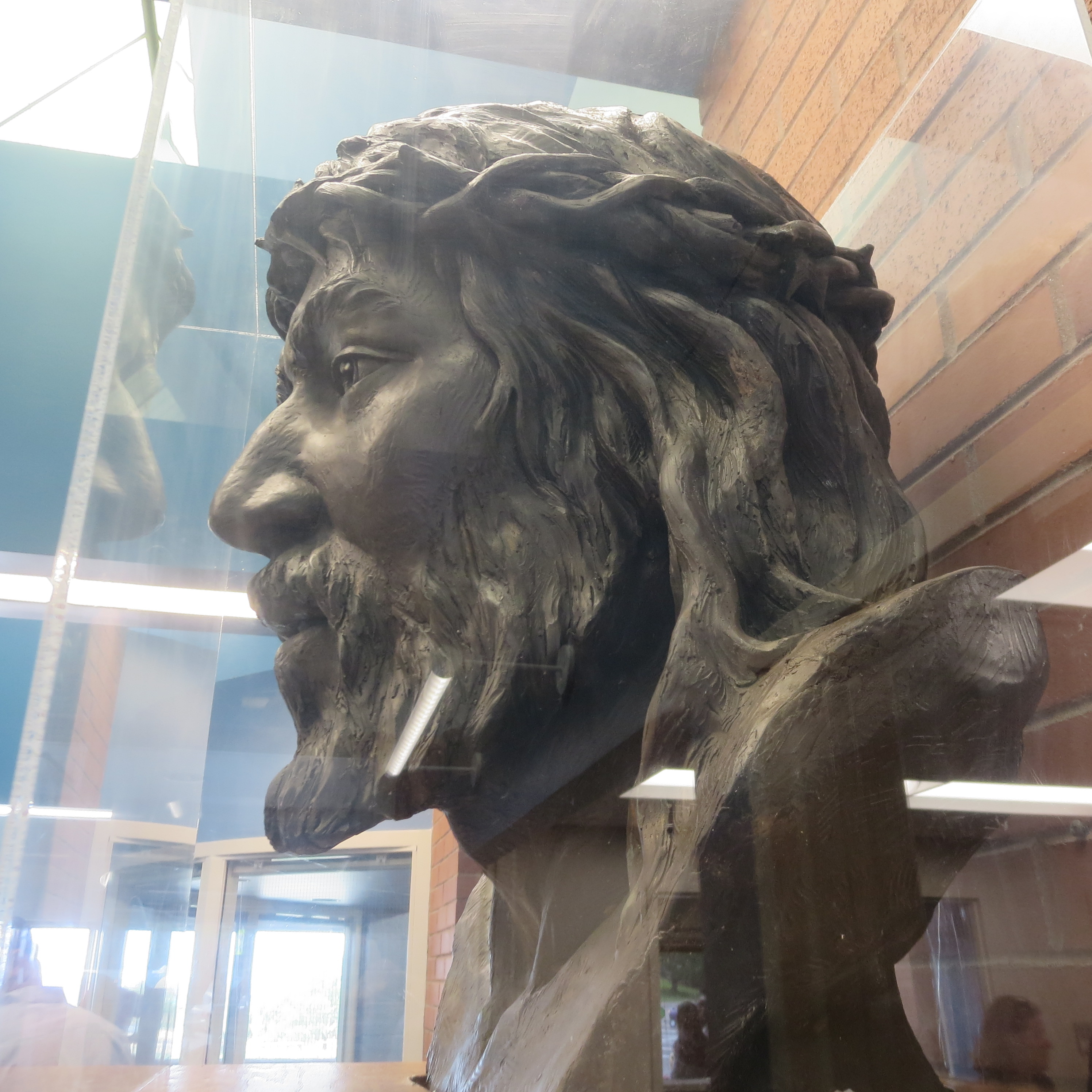 Larger than life sculpture by Victor Issa, "Woman Behold Thy Son."