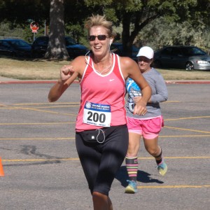 Geraldine Walker smiles through the finish line