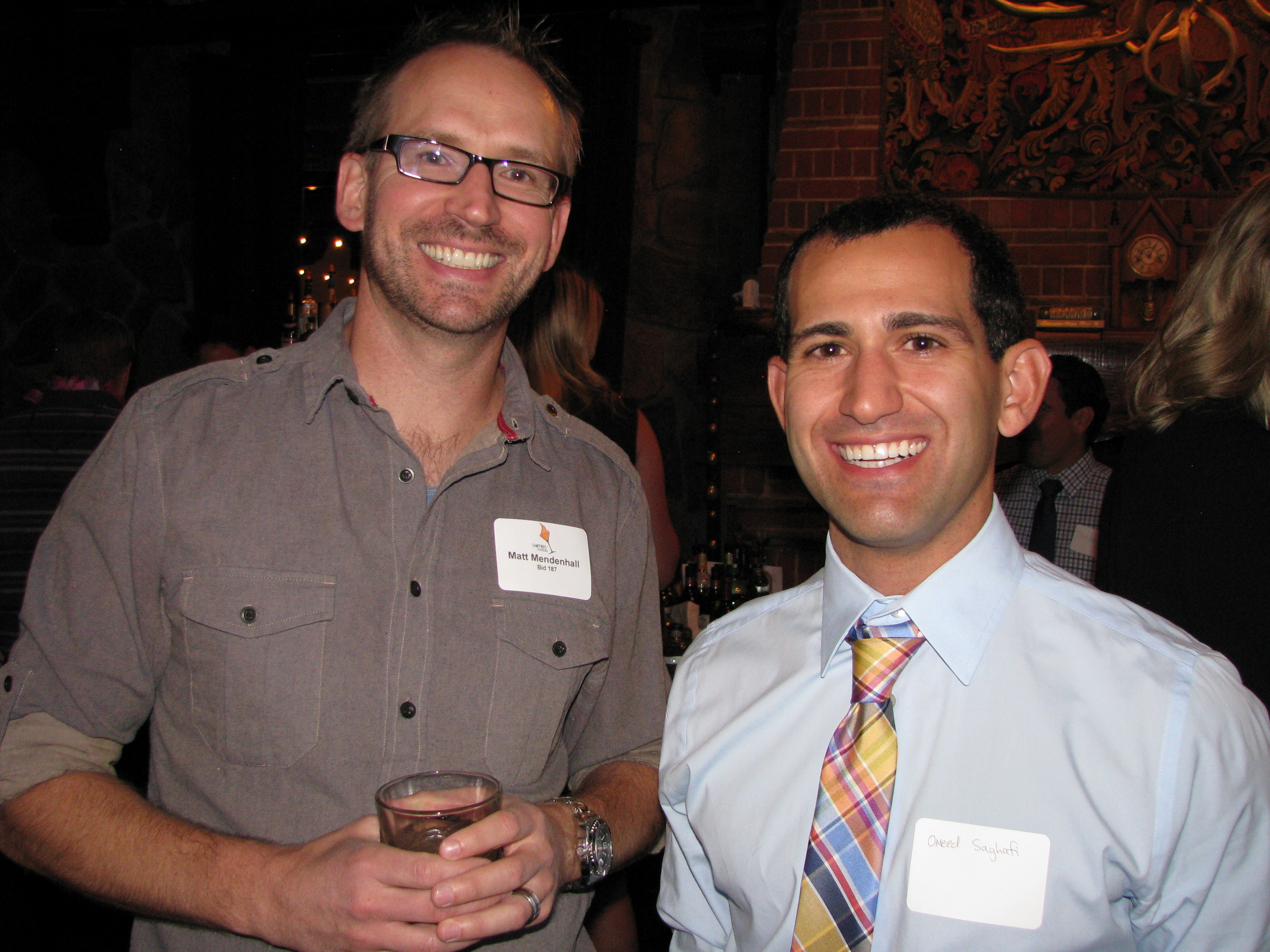 Matt Mendenhall, left, catches up wiht Omeed Saghati