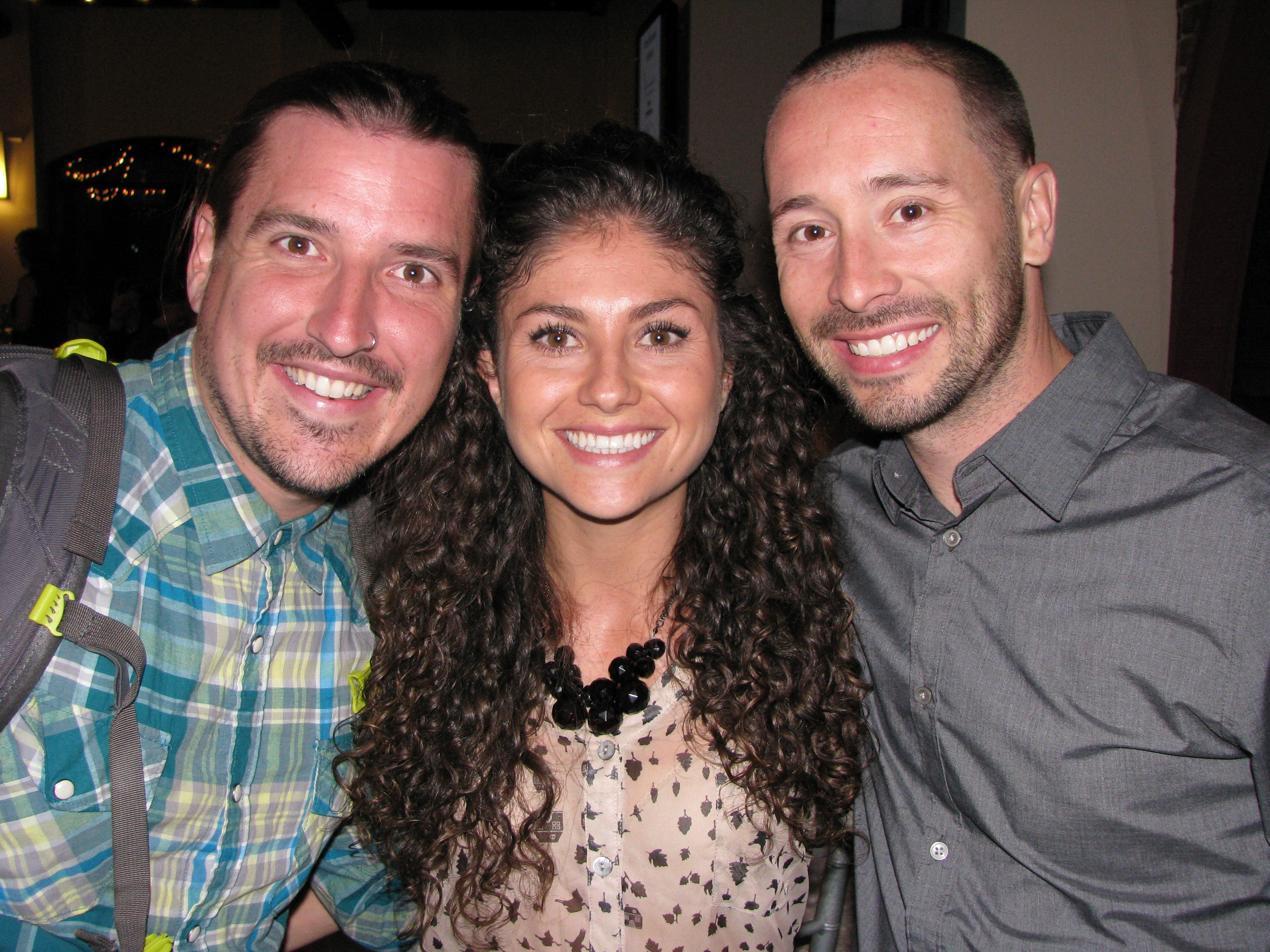 Jeremy Pape, left, smiles with Dani Espinosa and Jason Coates