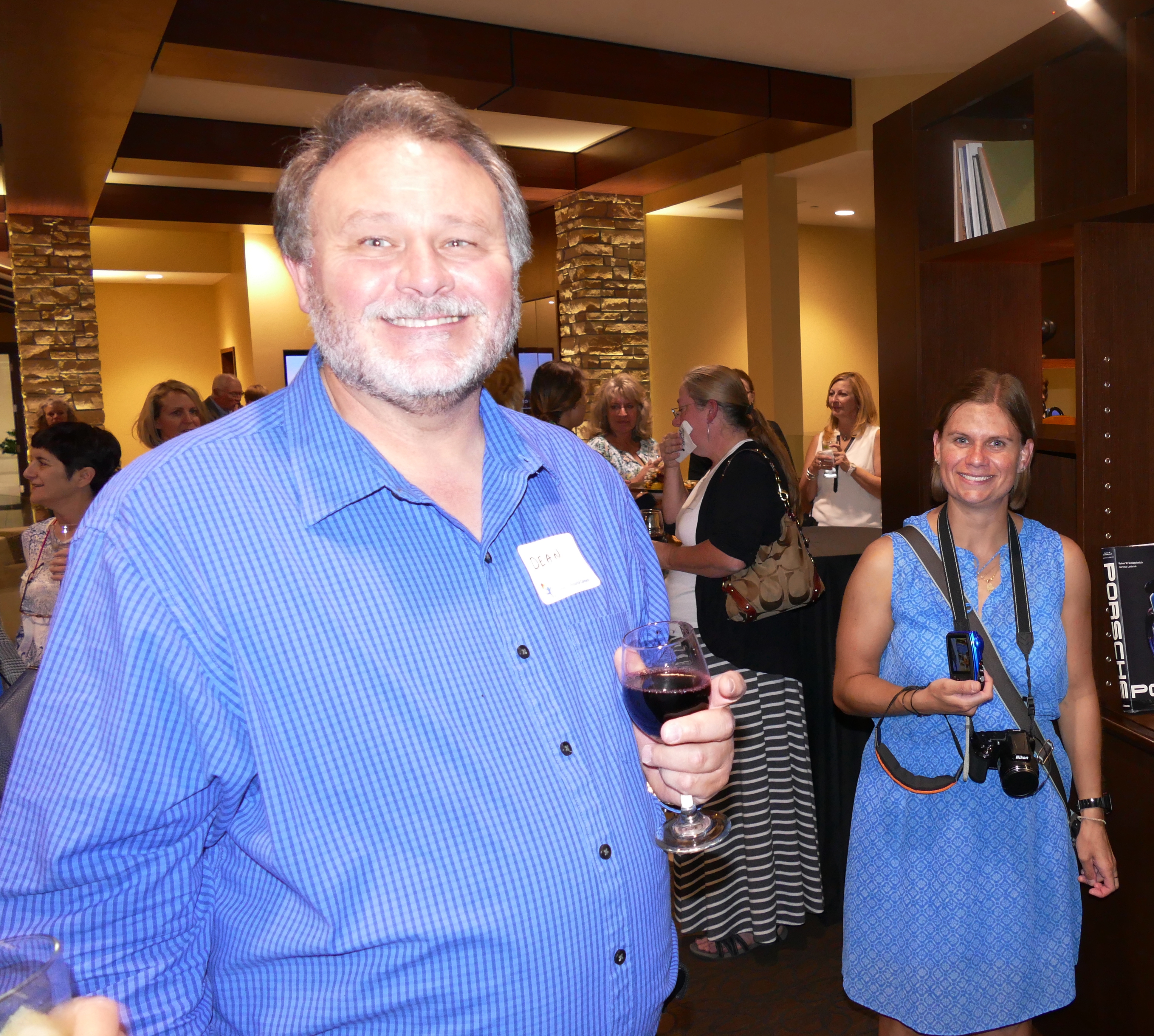 Dean Dubach won one of the drawing prizes as Sara Schaffer looks on