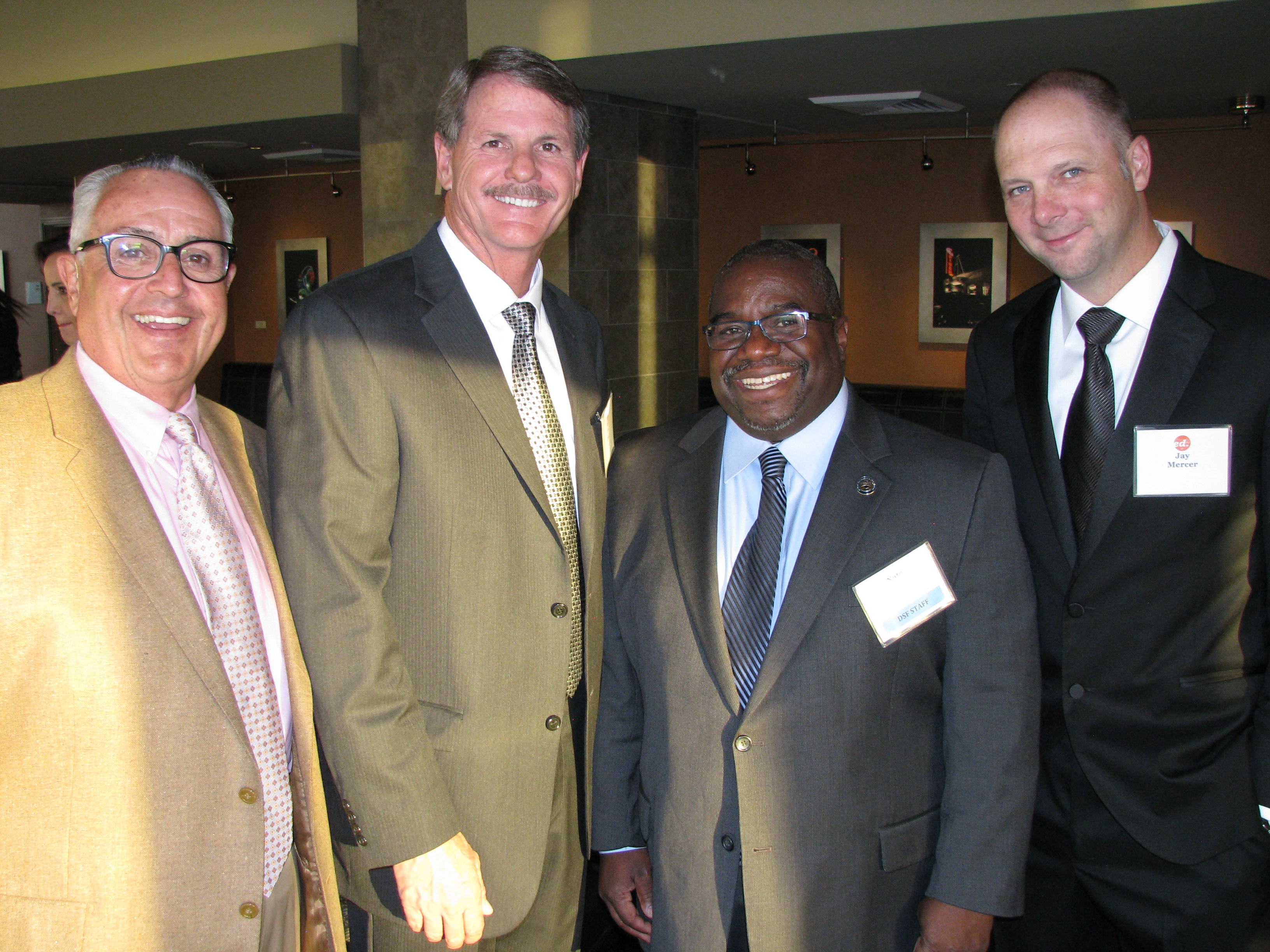 The sun shines on these DSF supporters: David Aria, left, Tim Crist, Dr ...