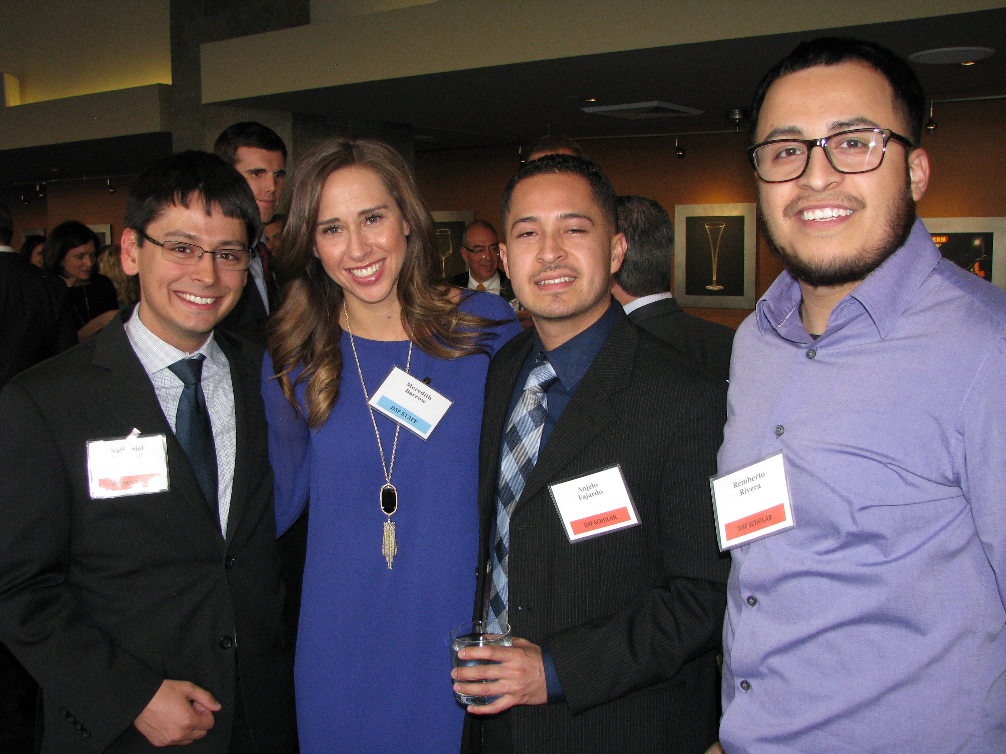 Nathaniel Marshall, left, smiles with Meredith Barrow, Angelo Fajardo ...