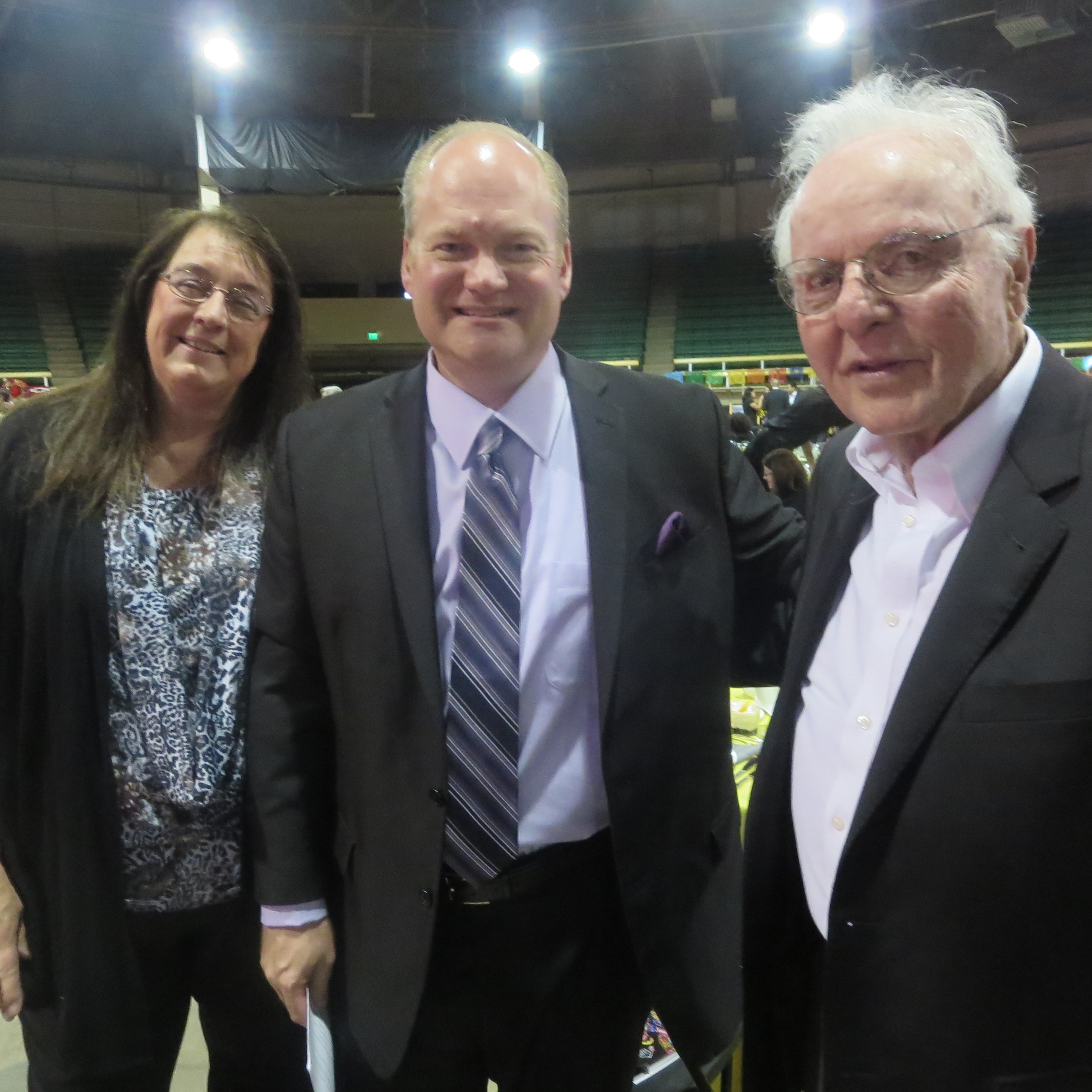 L to R: Eileen Koop, Emcee, Greg Moss, Max Appel
