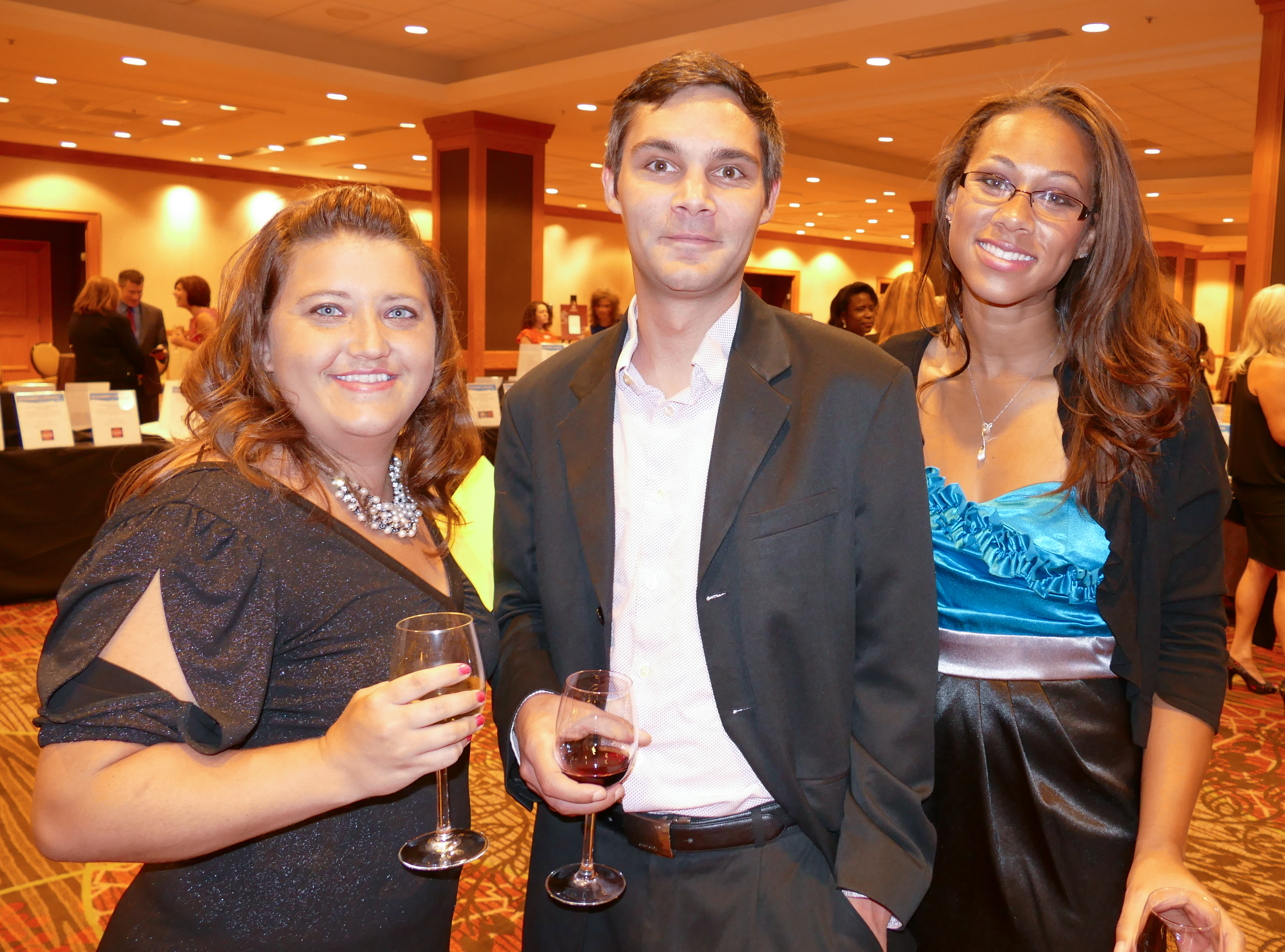 Eugena Janssen, left, Ryan Lucas and Ashley Wiggins