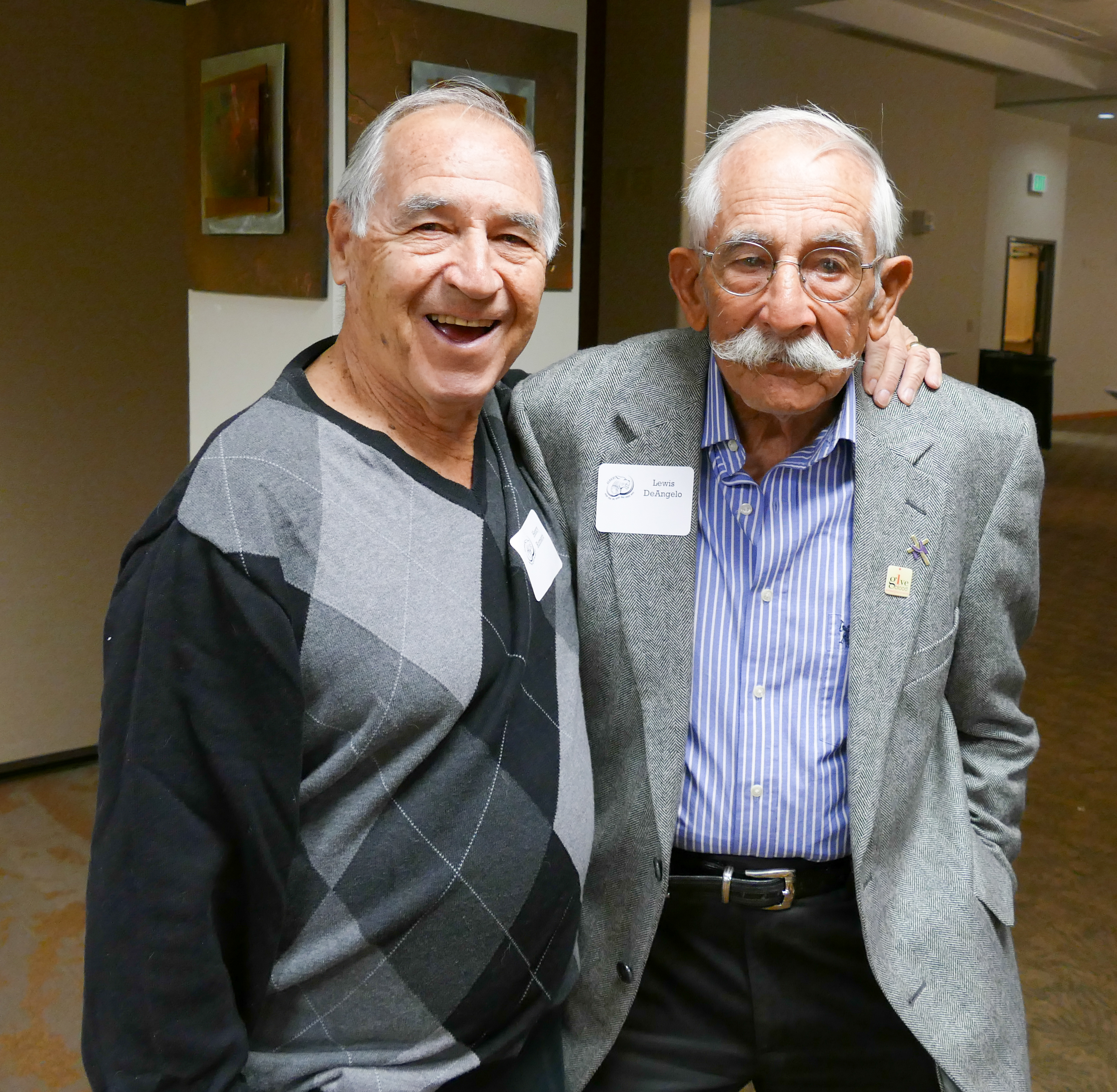 Henry Romero, left, with old friend Lewis DeAngelo ('53)