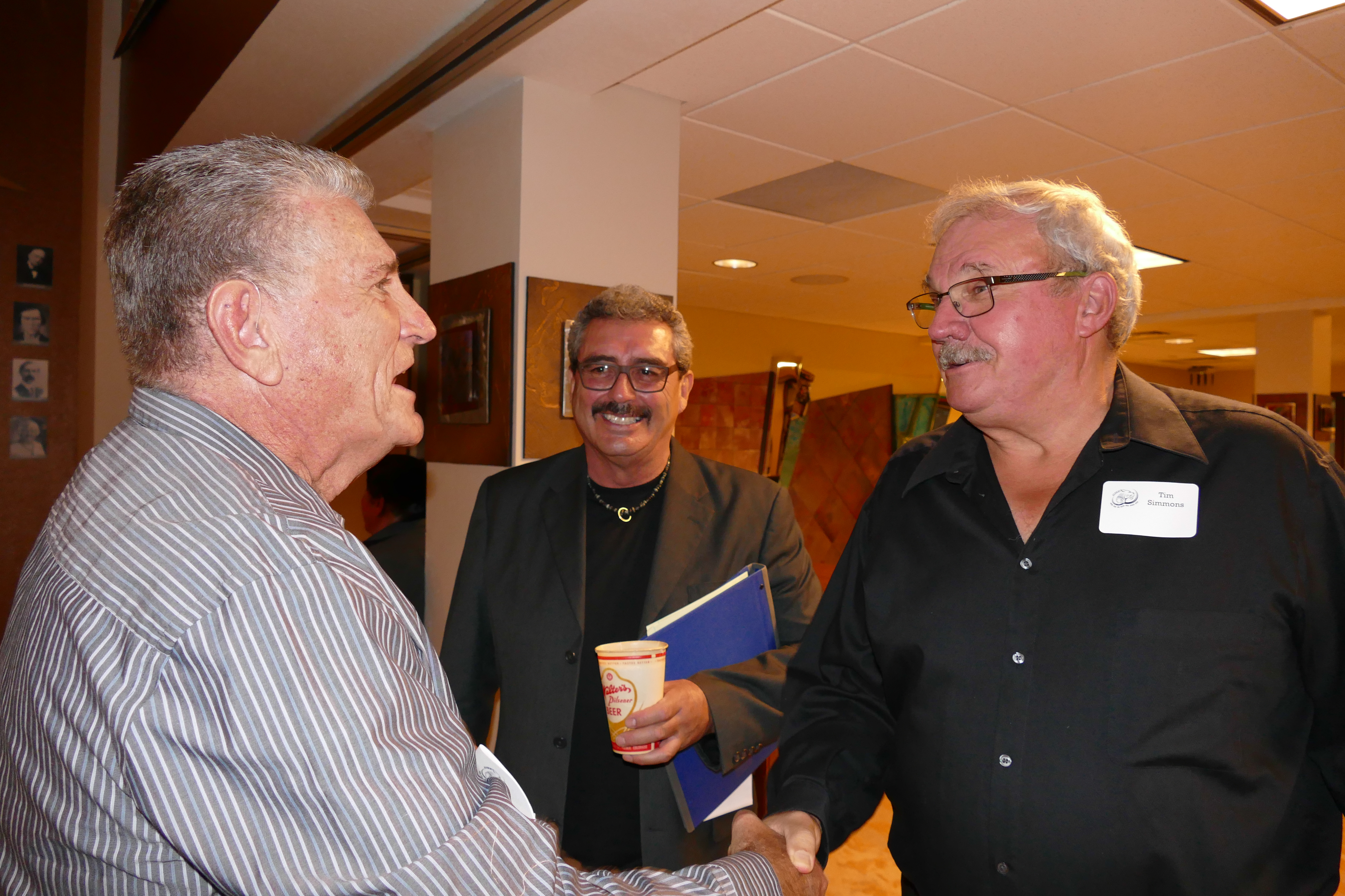 Pat McGraw, left, Ralph Gonzales, Tim Simmons