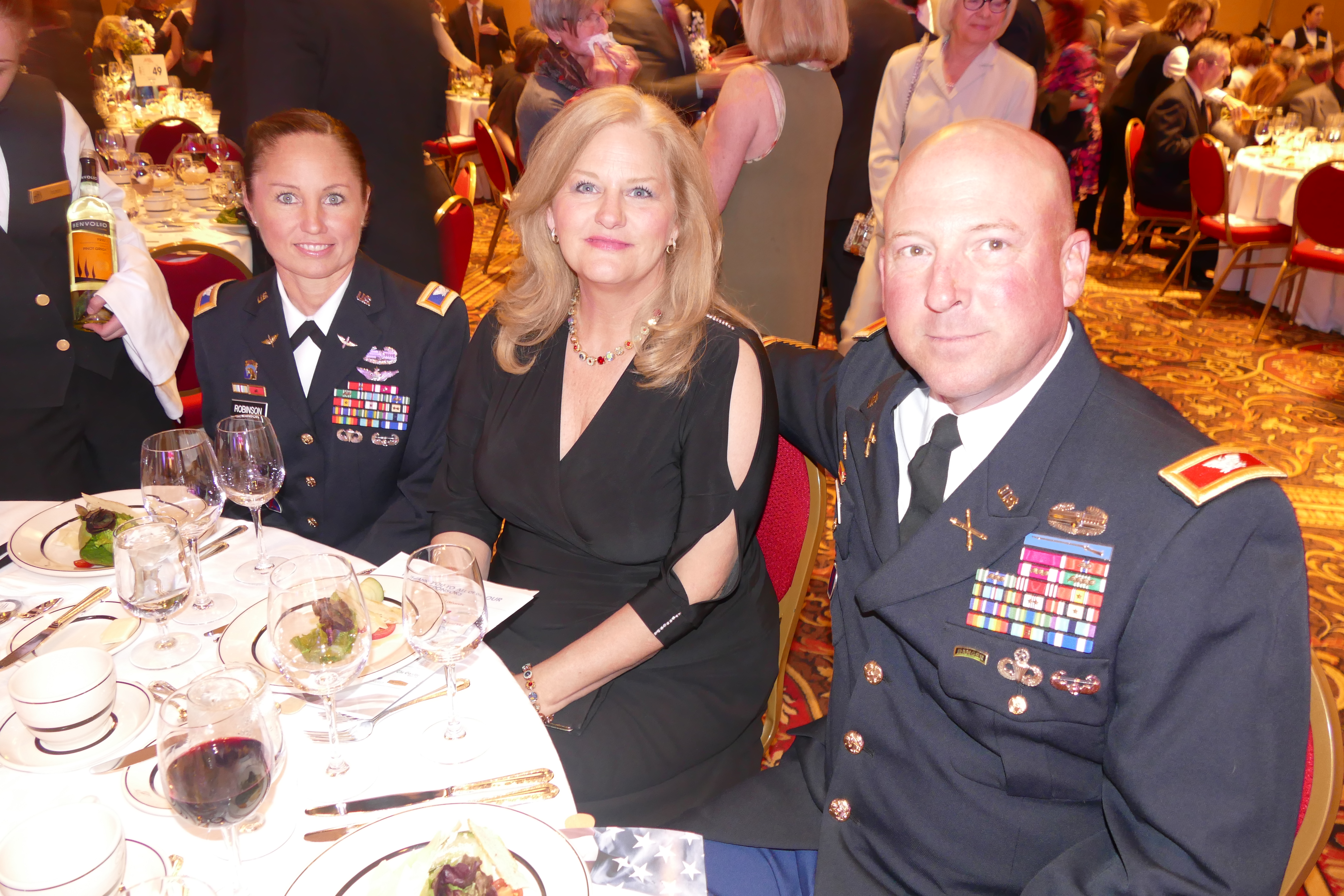 Colonel Lori Robinson, left, Pamela and Colonel Mike Oeschger