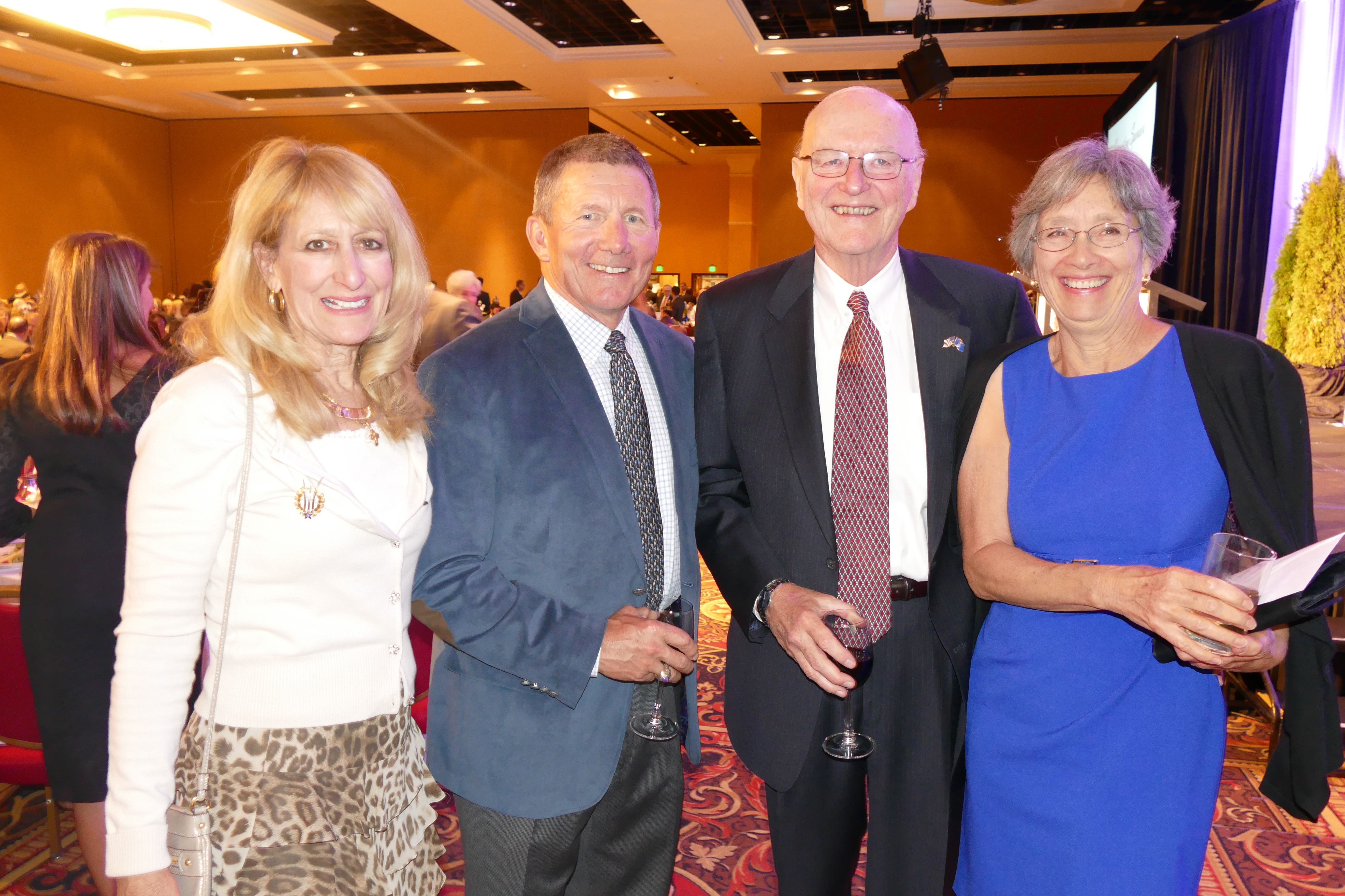 Paula and Mike Gould, left, with Peter and Vivian Teets