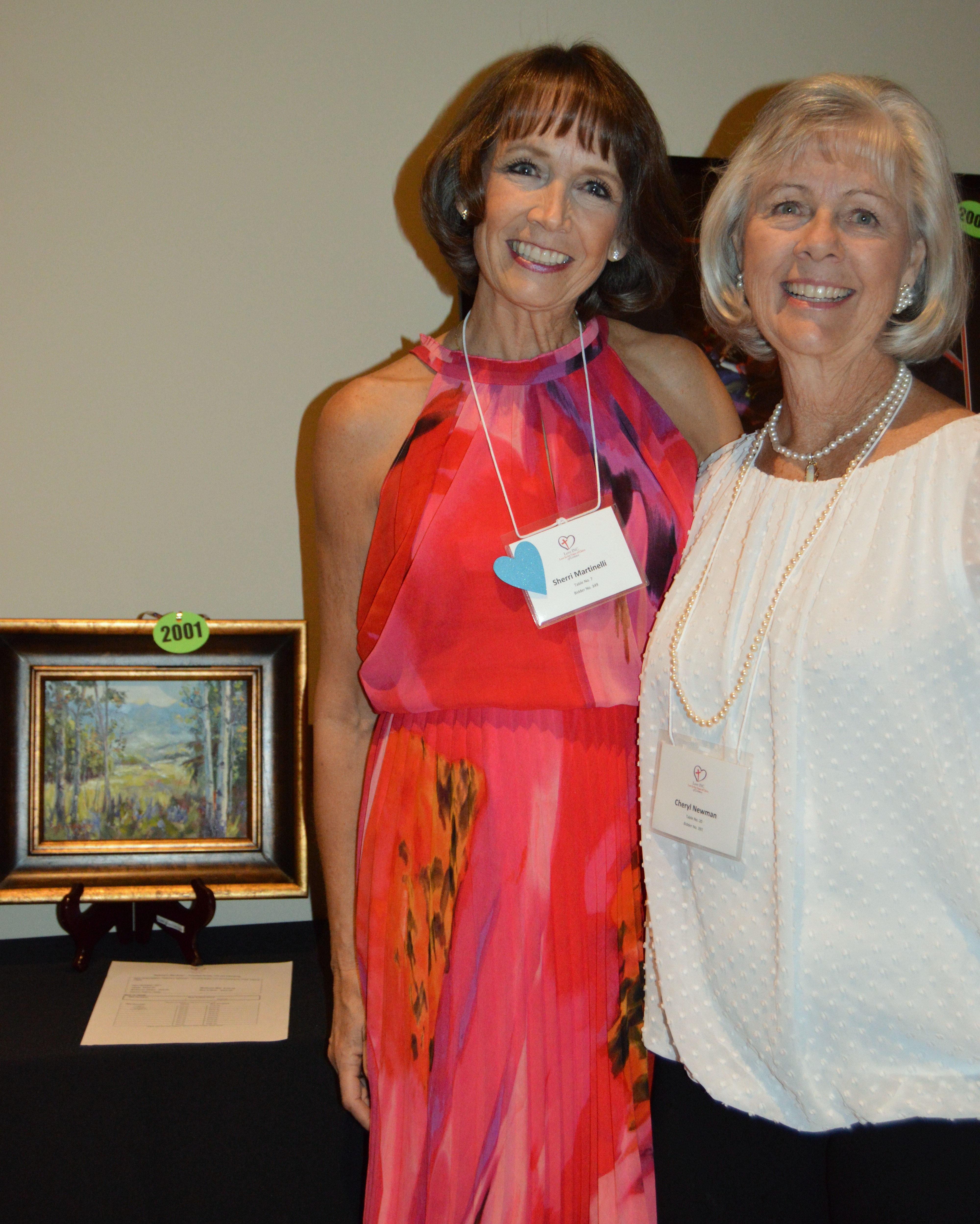 Board member Sherri Martinelli (left), with Cheryl Newman