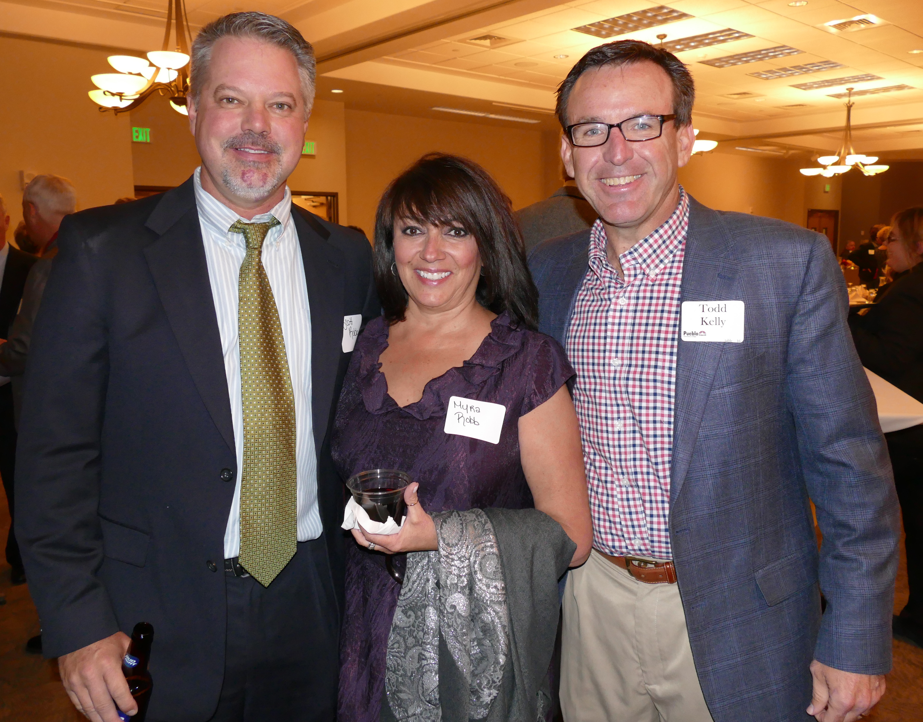 Scott and Myra Robb, left, with Todd Kelly