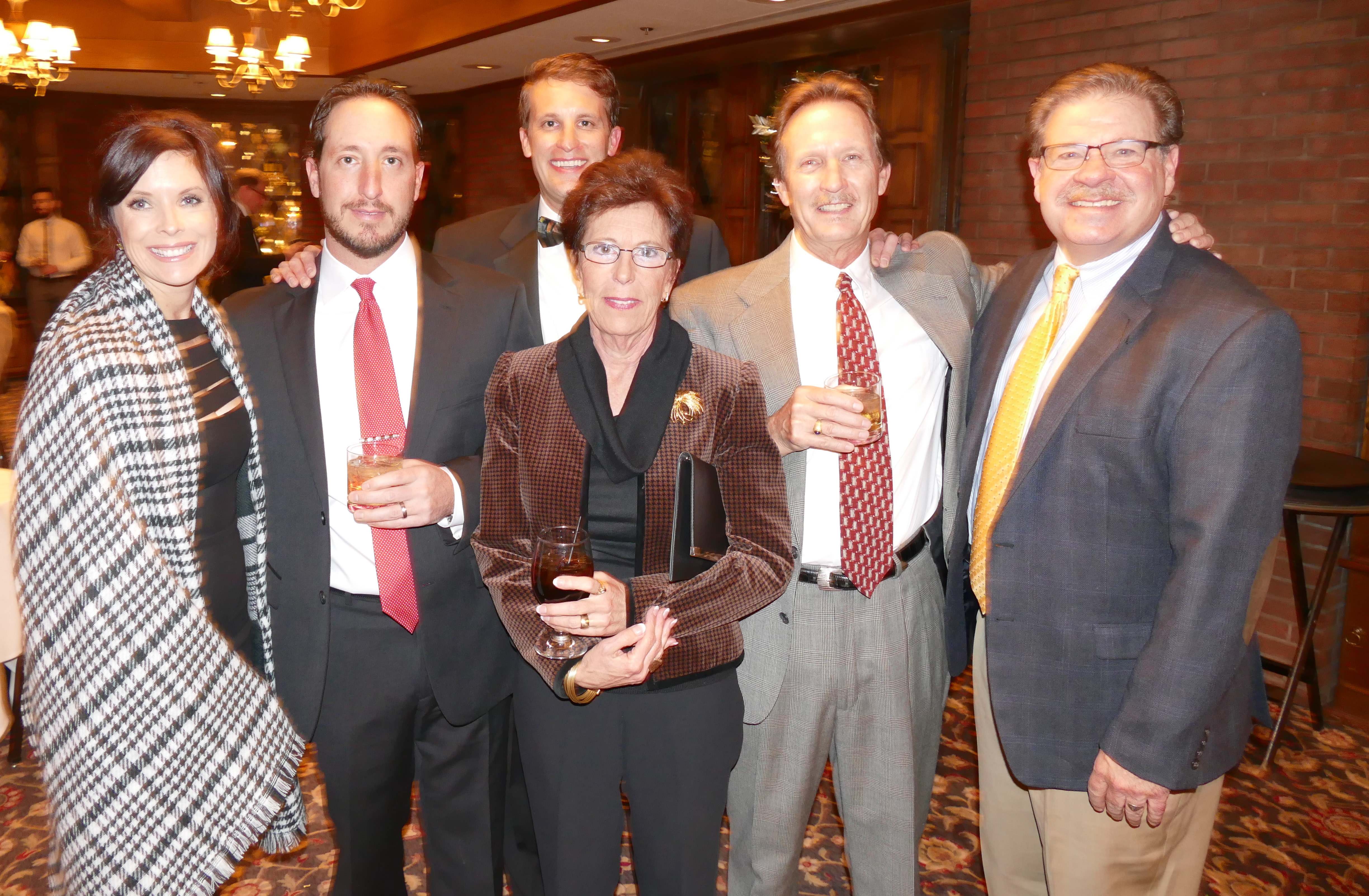 the Nevilles: Natalie and Adam, Joshua, Marilyn, Tom and Ron Linderman