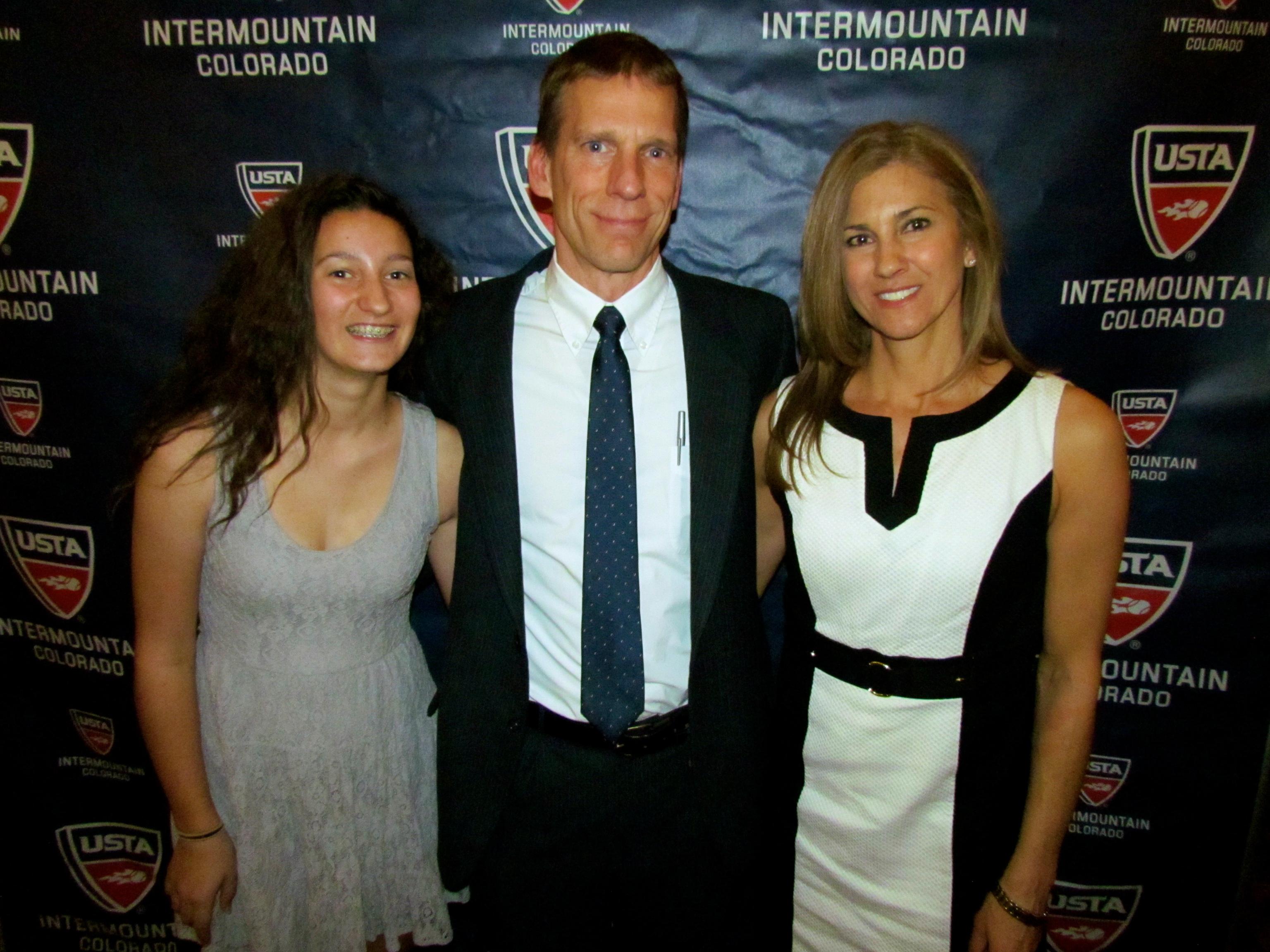 (l-r) Mavis Edwards, who is receiving a sportsmanship award, Paul and ...