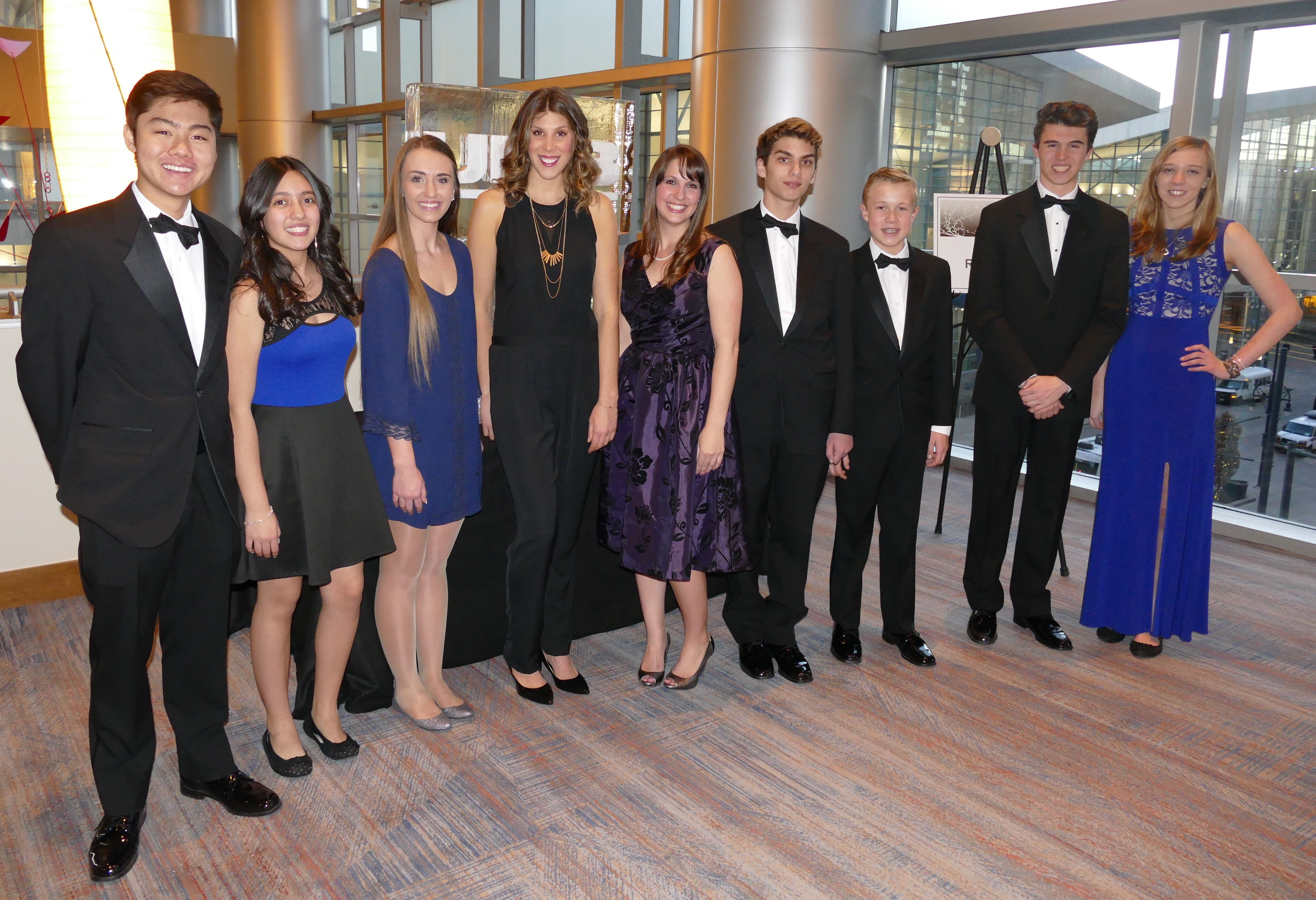 Some of the Junior Achievement student ambassadors helped to greet ...