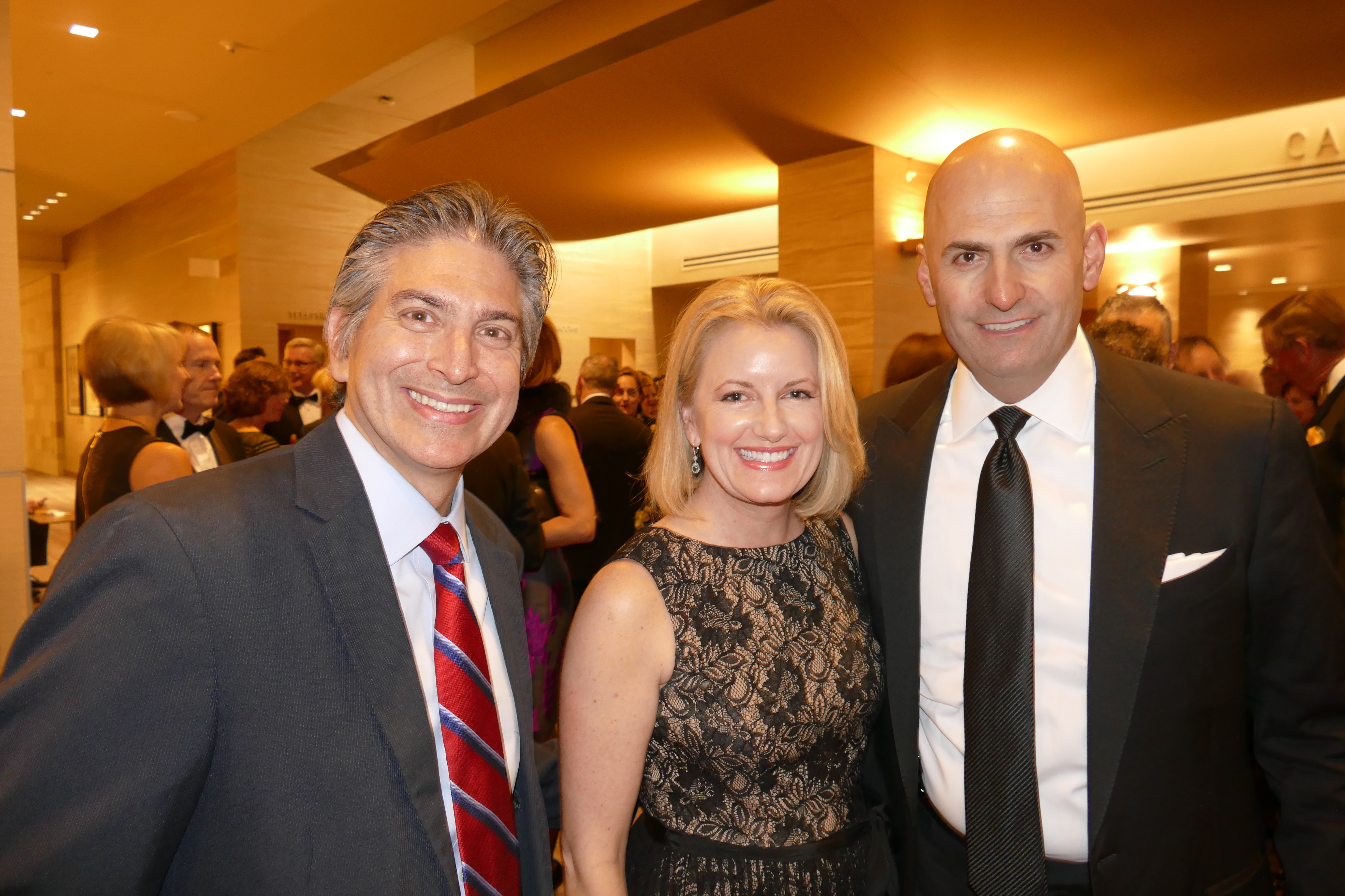 Luis Colon, left, with Sheila and Hassan Salem