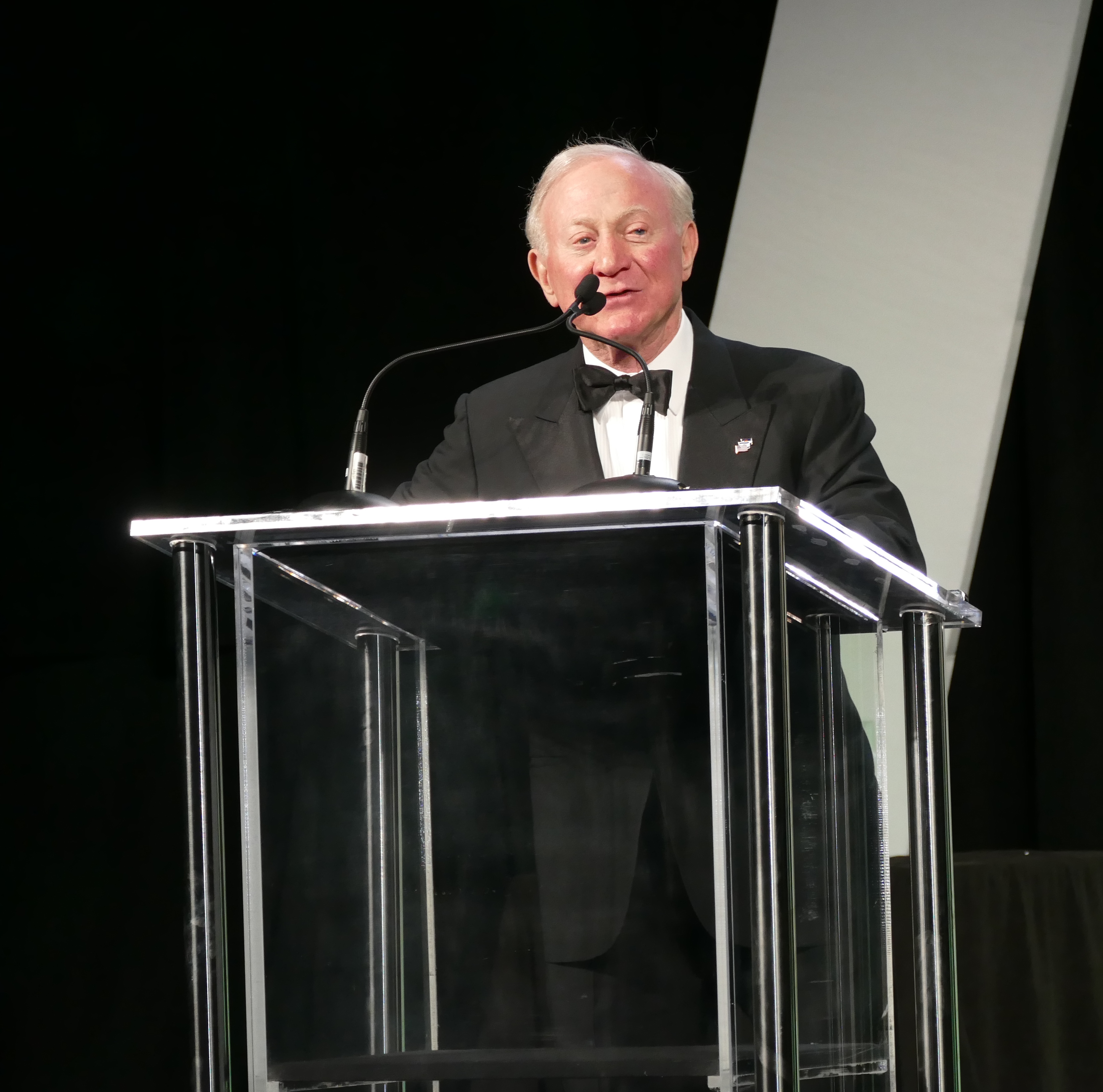 Larry MIzel takes the stage to accept his Laureate award