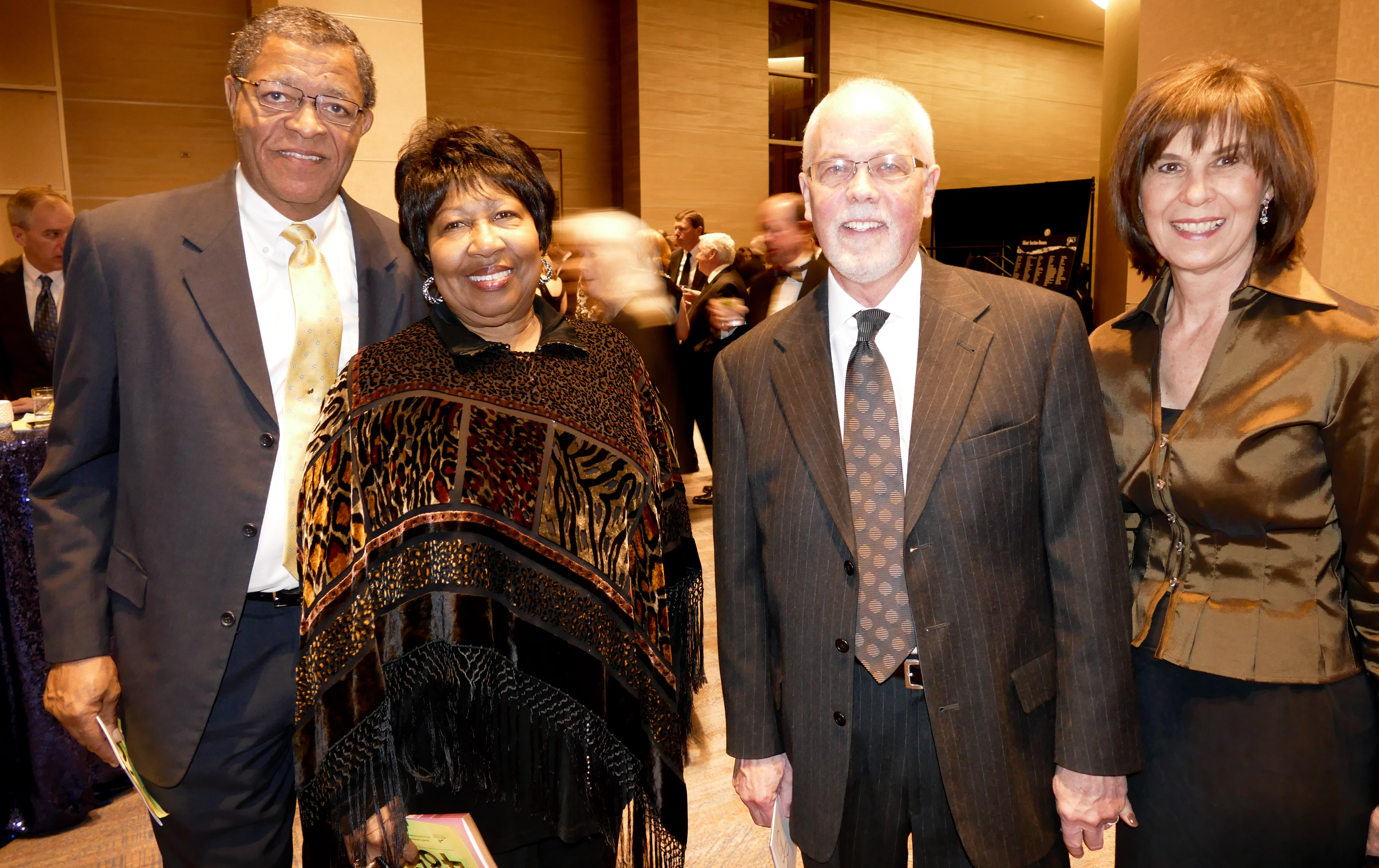 Tom and Joni Fortson, left, with Jon and Bonnie McCracken