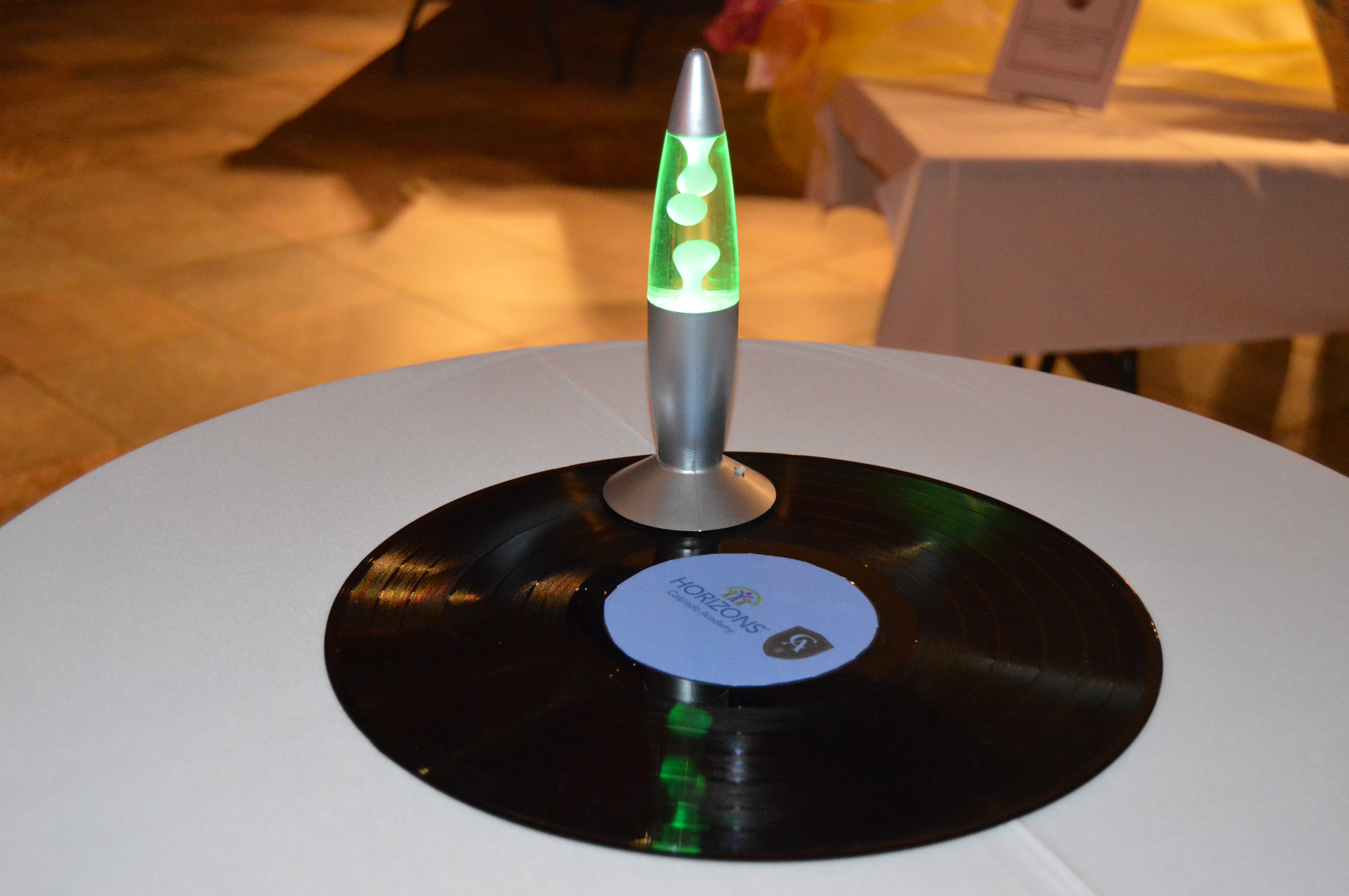 Mini-lava lamps and vinyl decorated the cabaret tables.