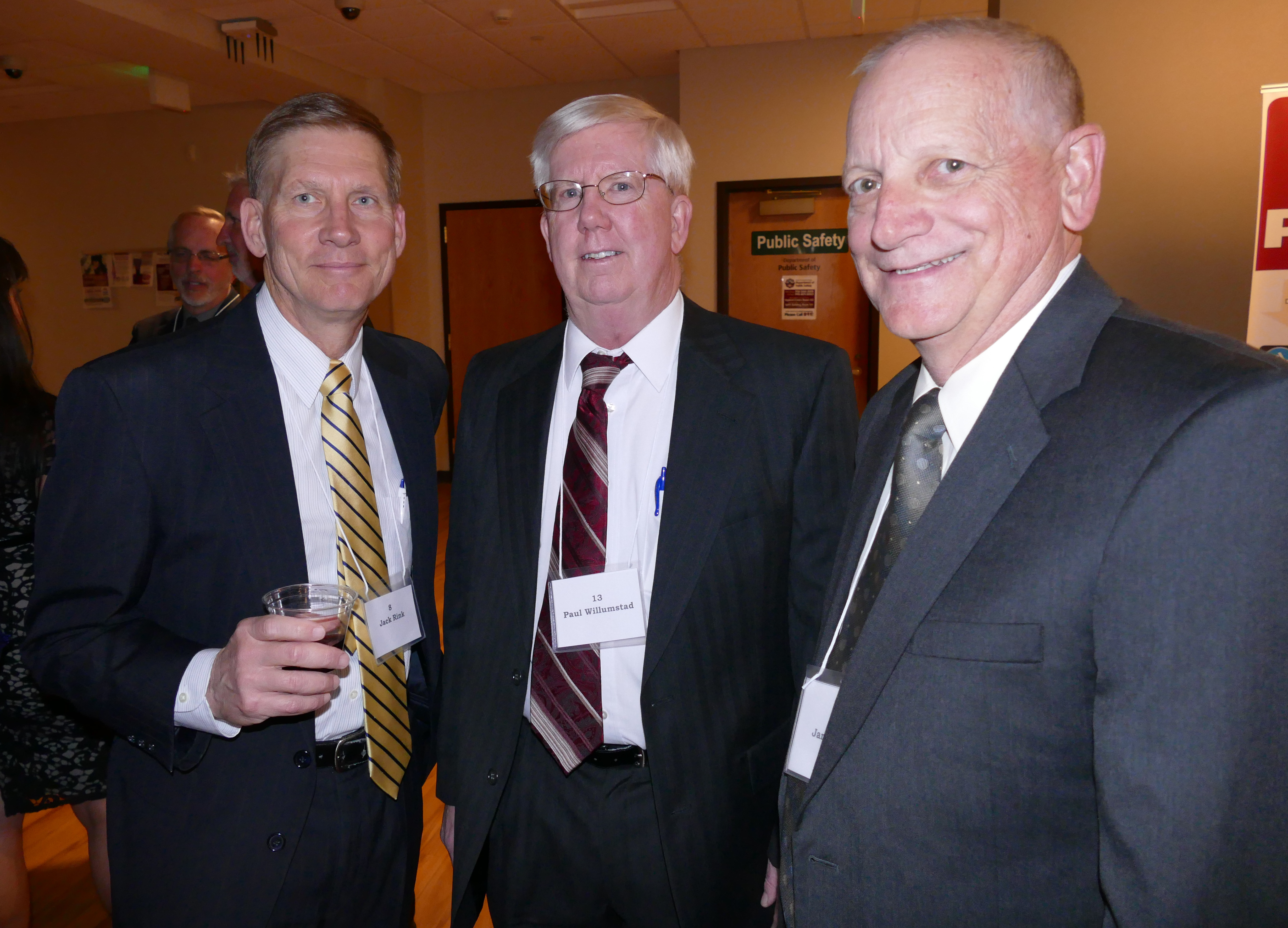 Jack Rink, left, board member Paul Willumstad and Jim Duff