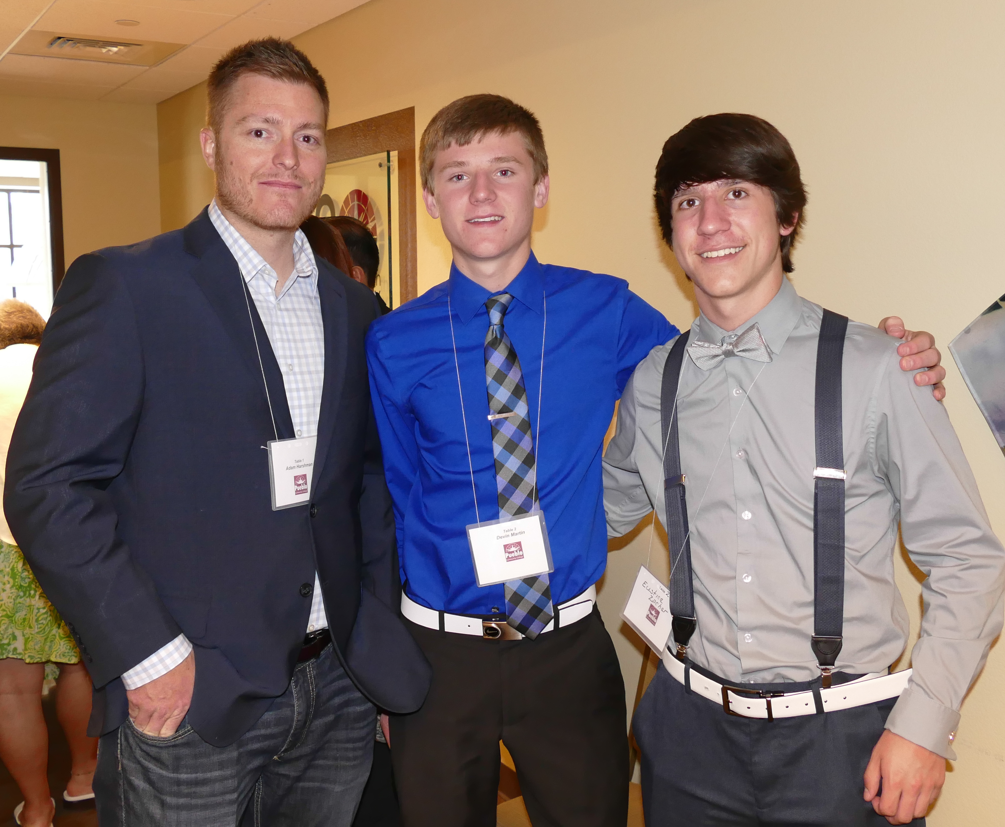Adam Harshmann, left, Devin Martin, Eustice Zacher