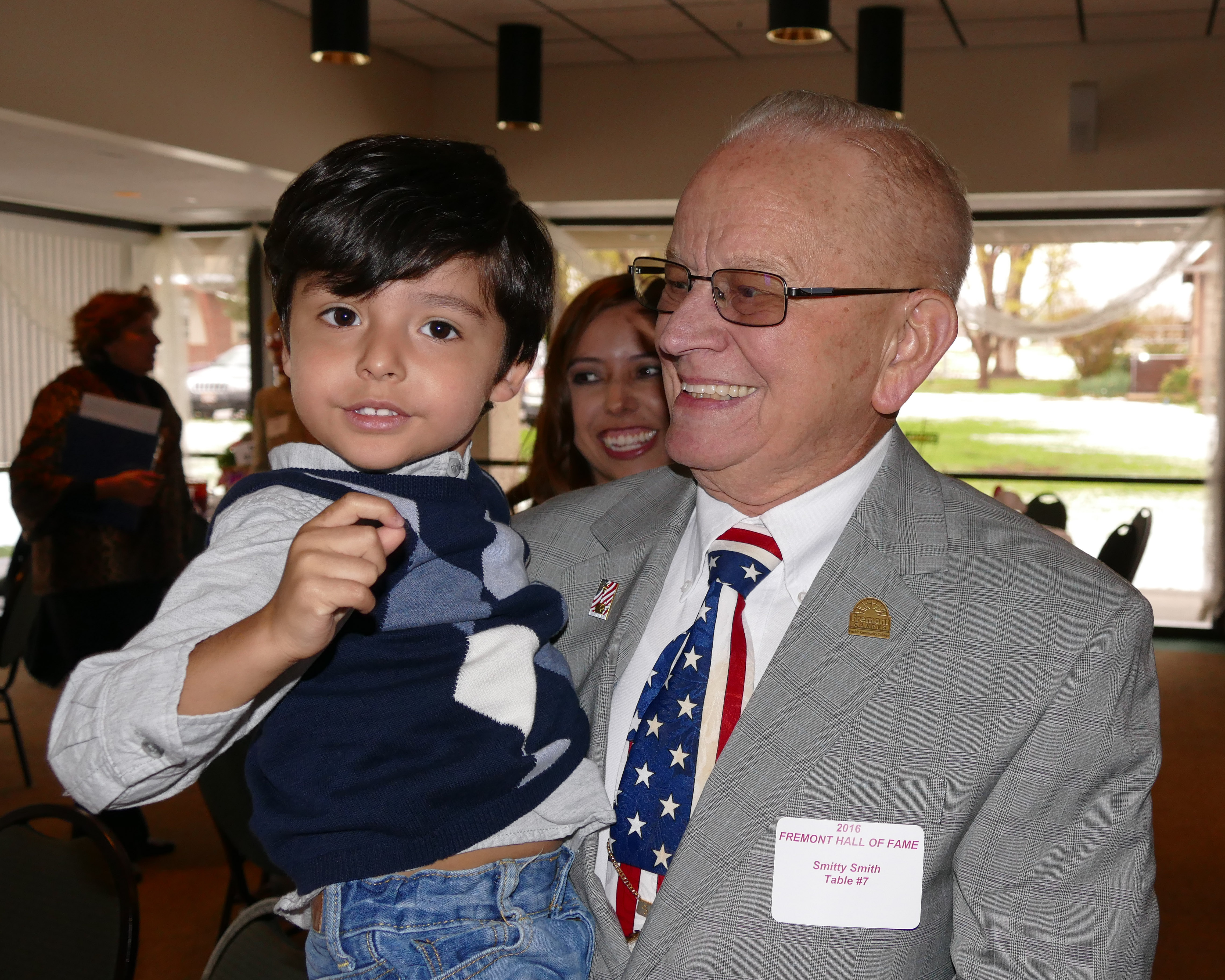 Inductee Smitty Smith proudly holds Isaiah