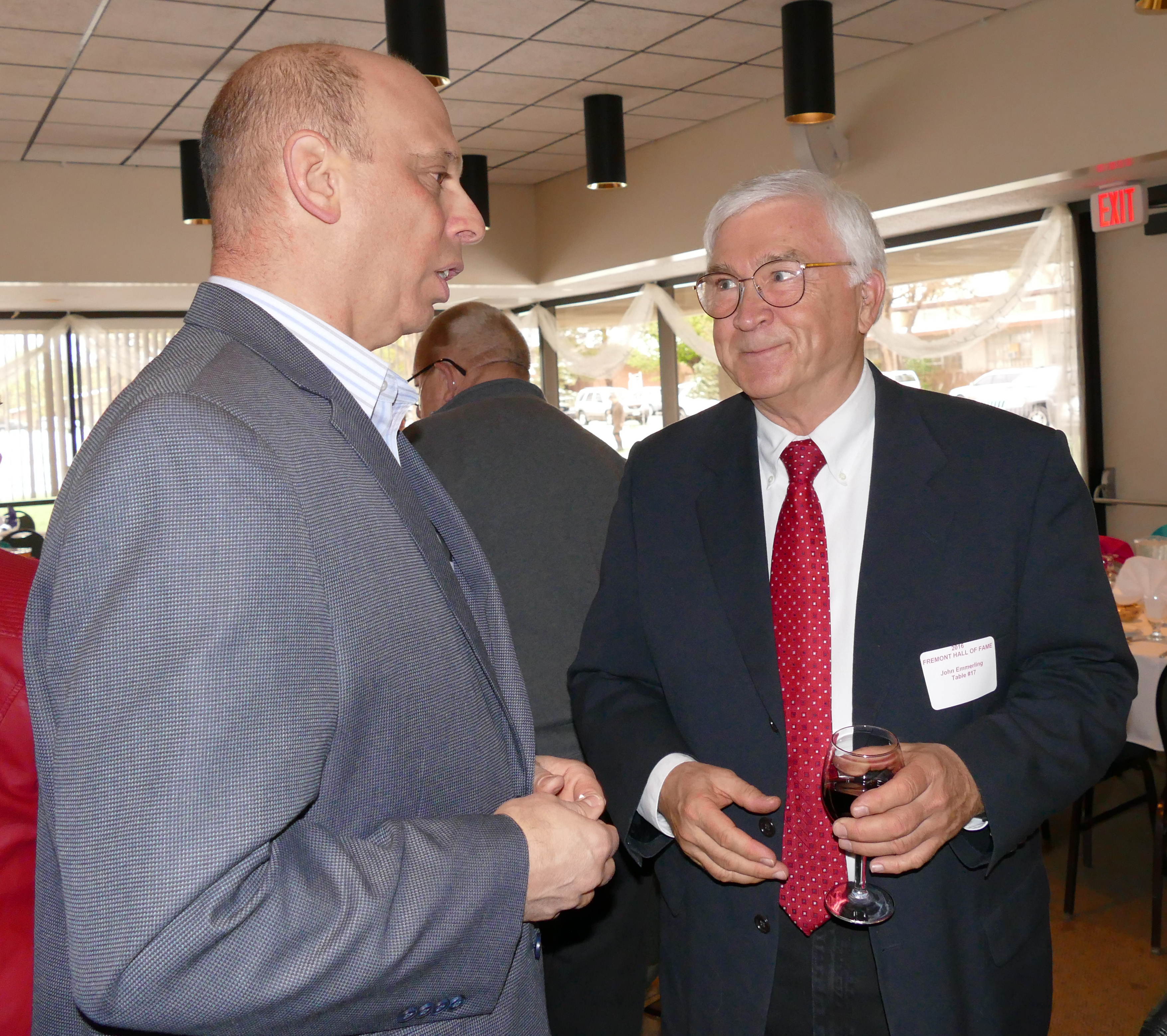 David Delvecchio, left, chats with John Emmerling
