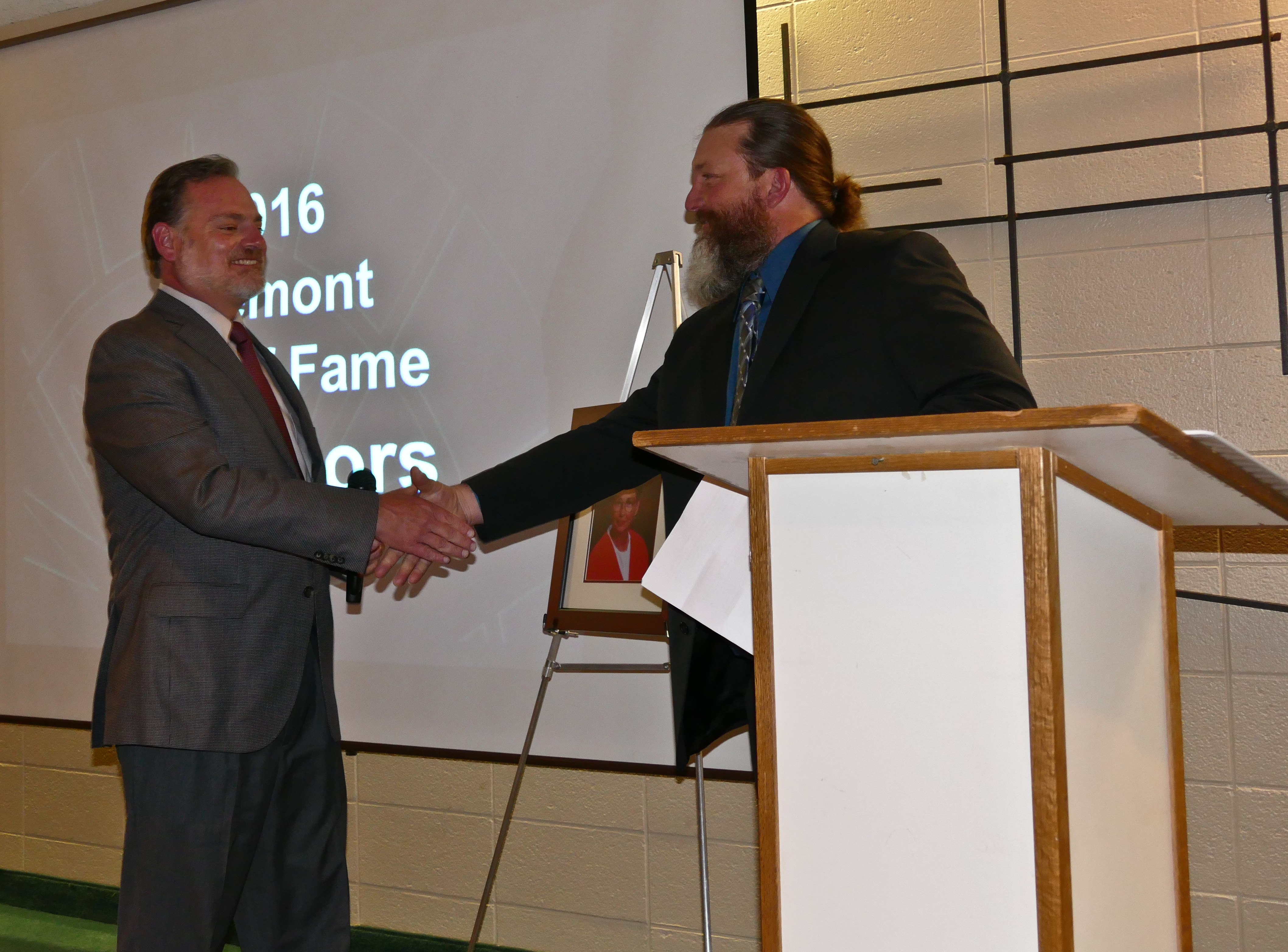 Will Colon, right, congratulates inductee Larry Oddo