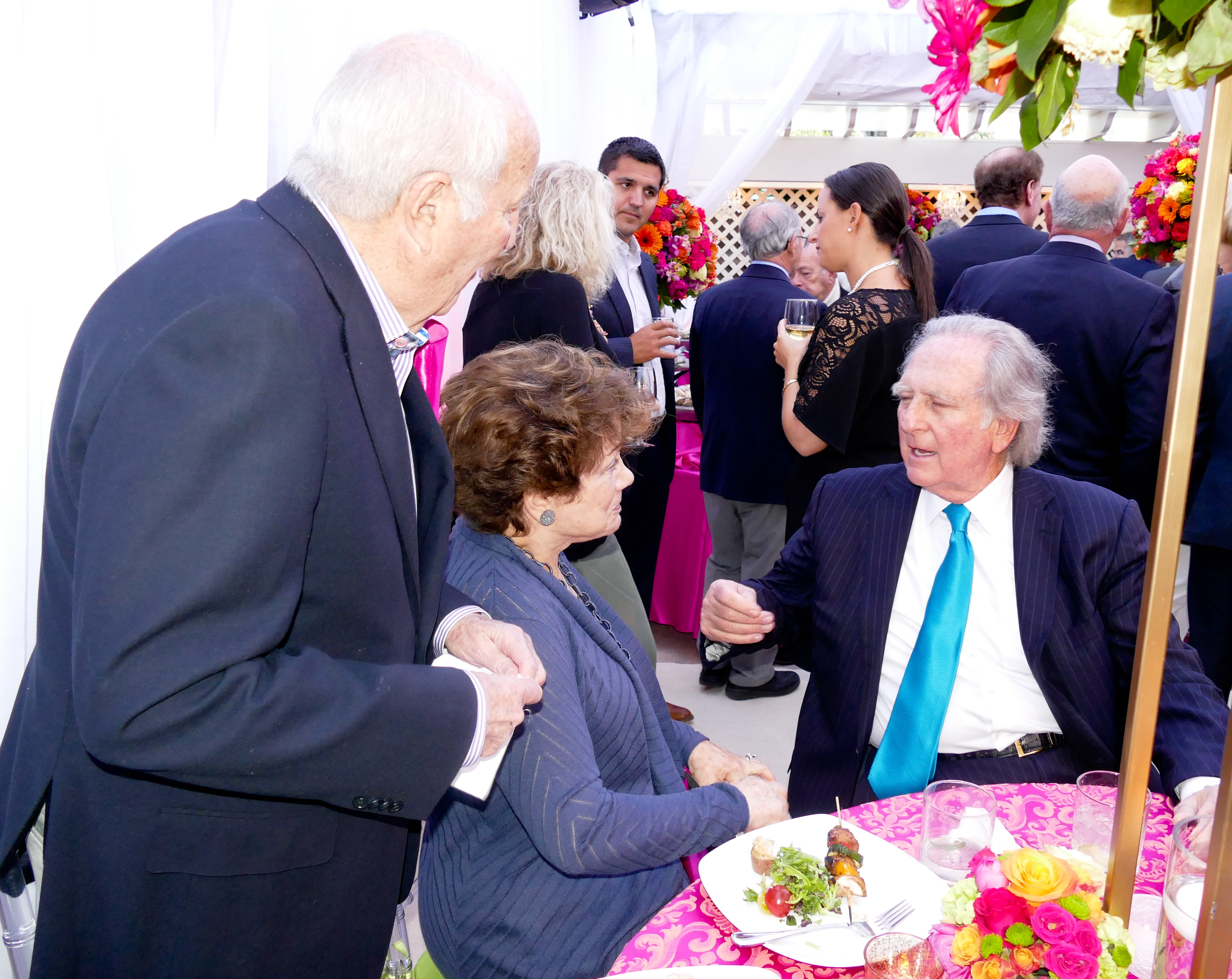 Dick and Marcia Robinson chat with Norm Brownstein