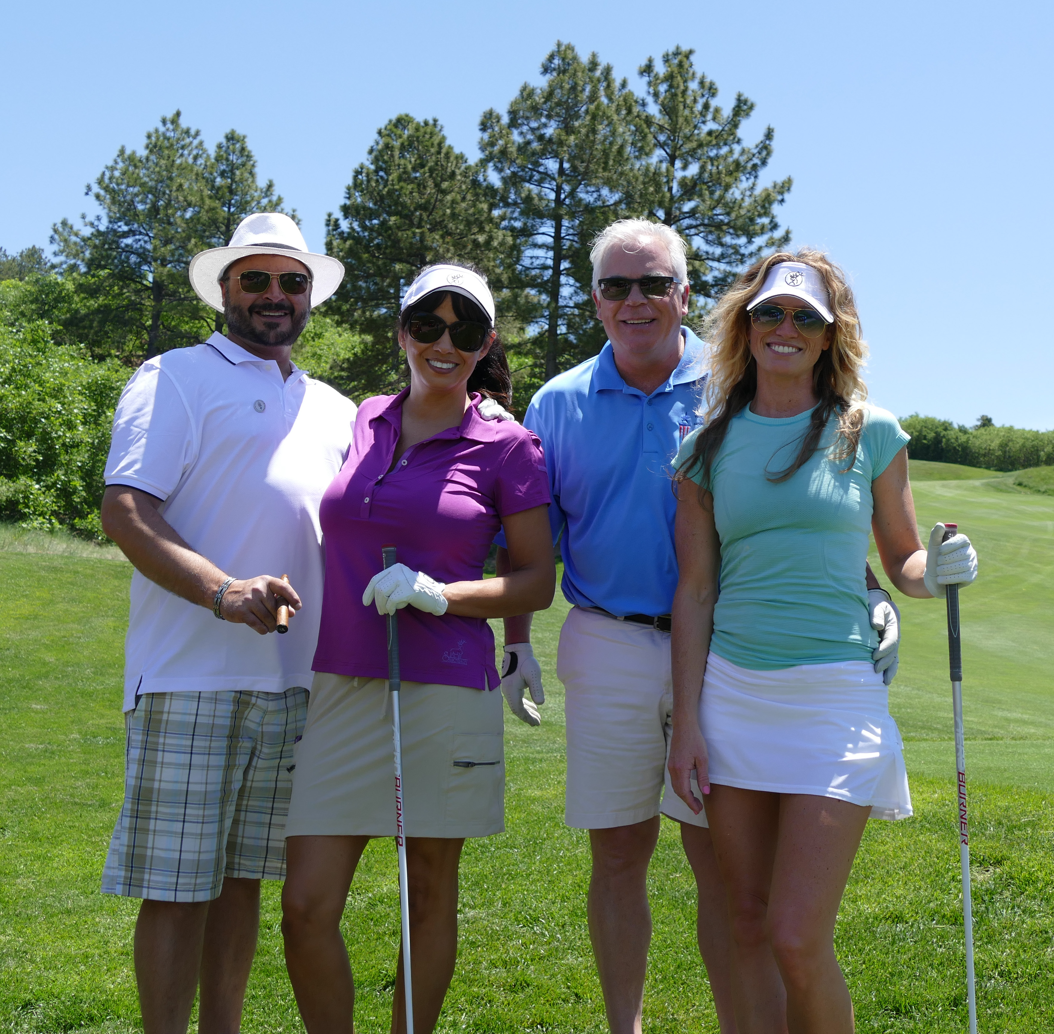 Derek and Denise Cohn, left, and Danny and Becky Mientka, Team Mientka