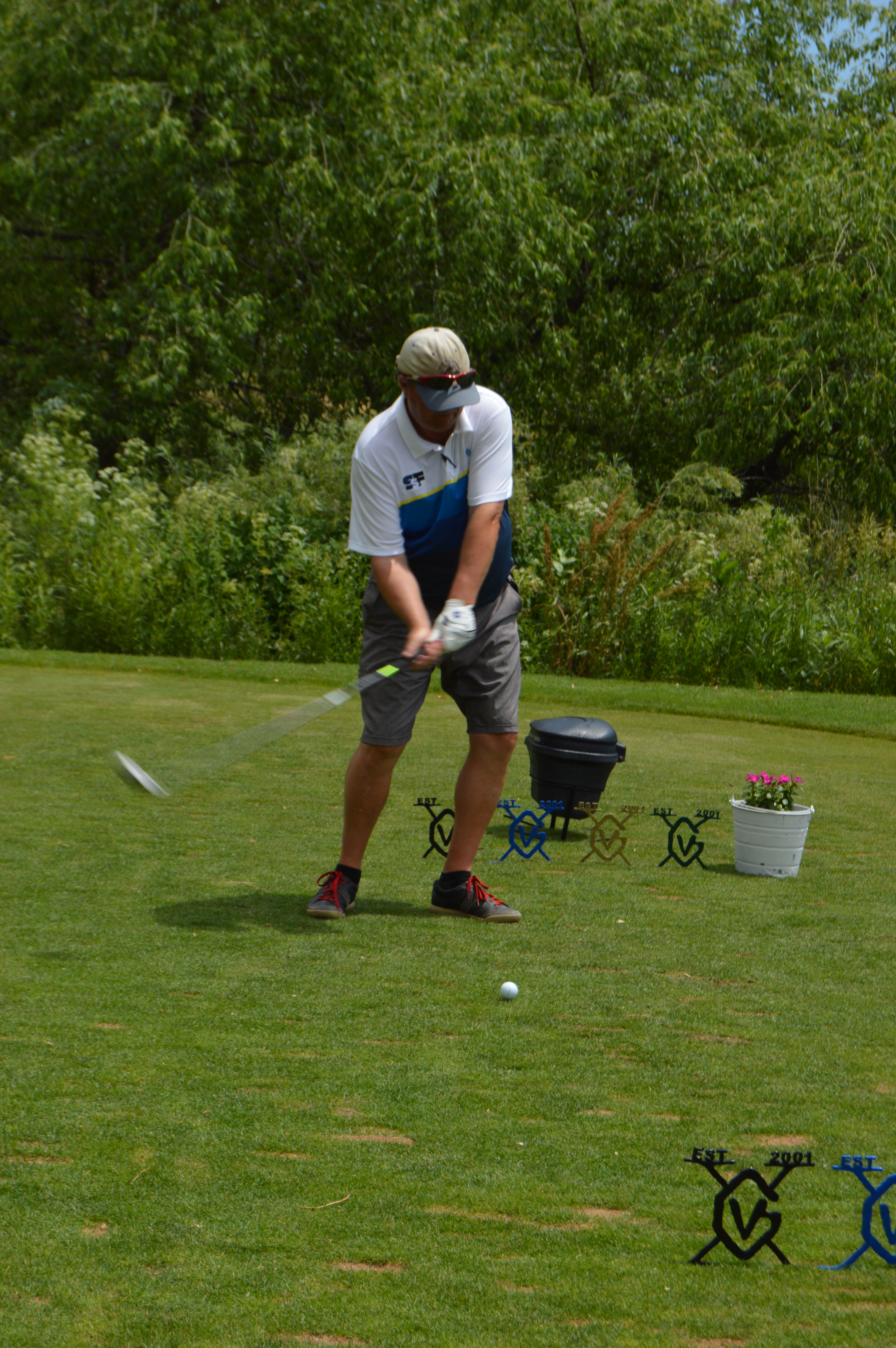 Darcy Narans, Stout Street CFO, starts his backswing.