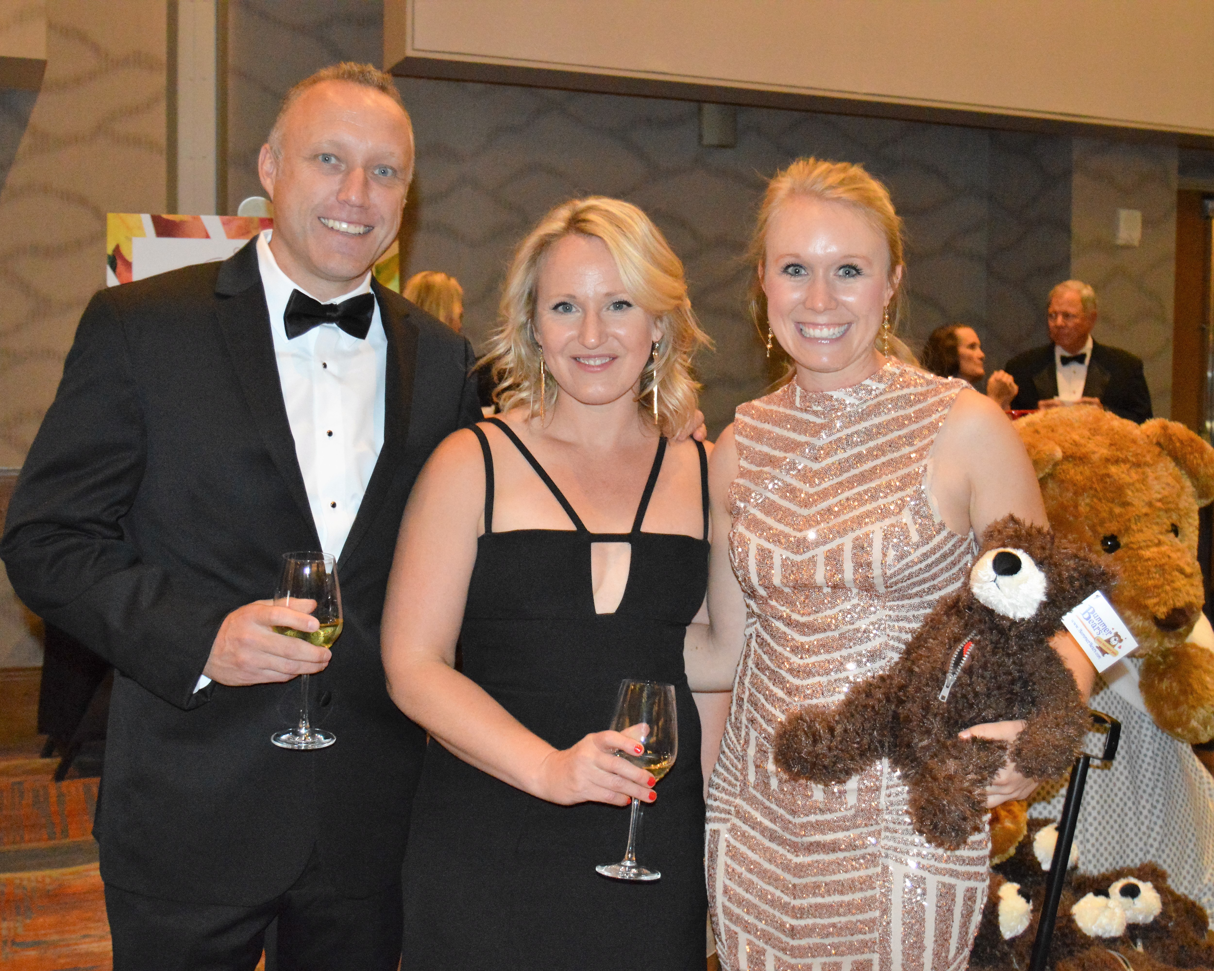 (l to r): Fran and Erin Bodine, and Kali Smith with a "Bummer Bear"