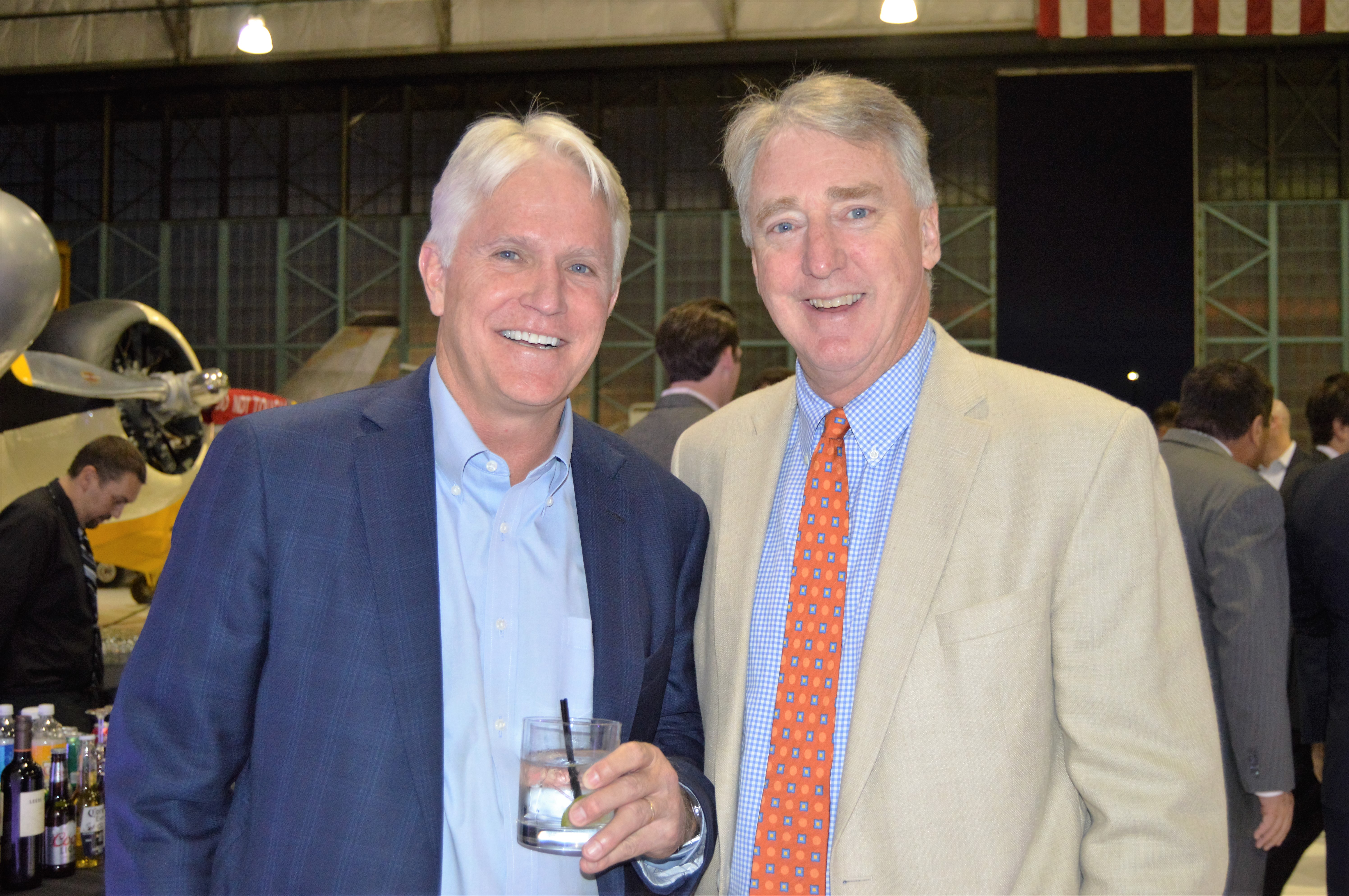 Eric Black (left), with Denver Broncos President and CEO Joe Ellis