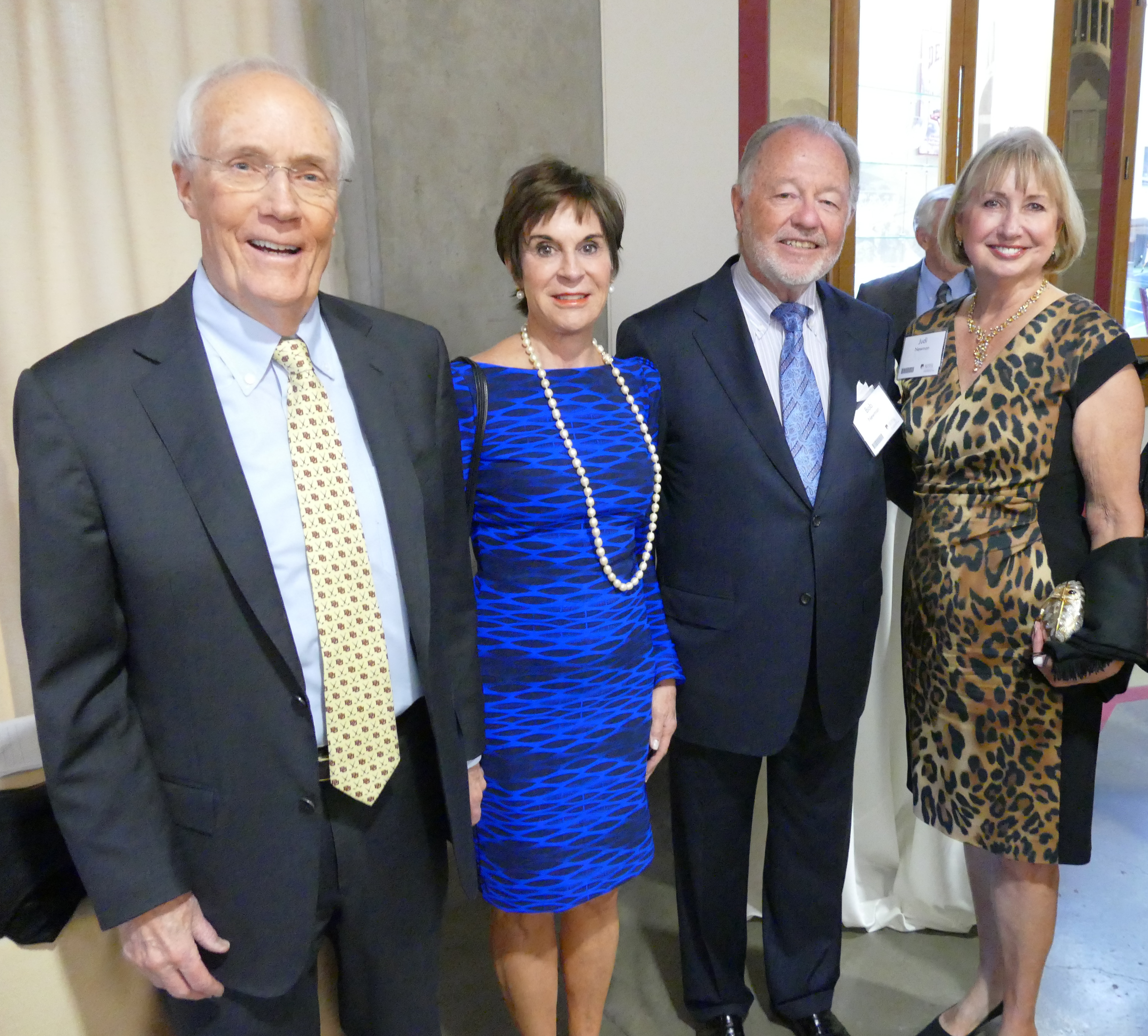 Tryg and Vicki Myhren (he's a trustee), left, with Bob and Judi Newman