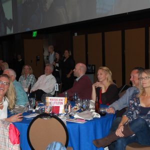 Tom and Sharon Scanlon clap after the results of their donated Kauai ...