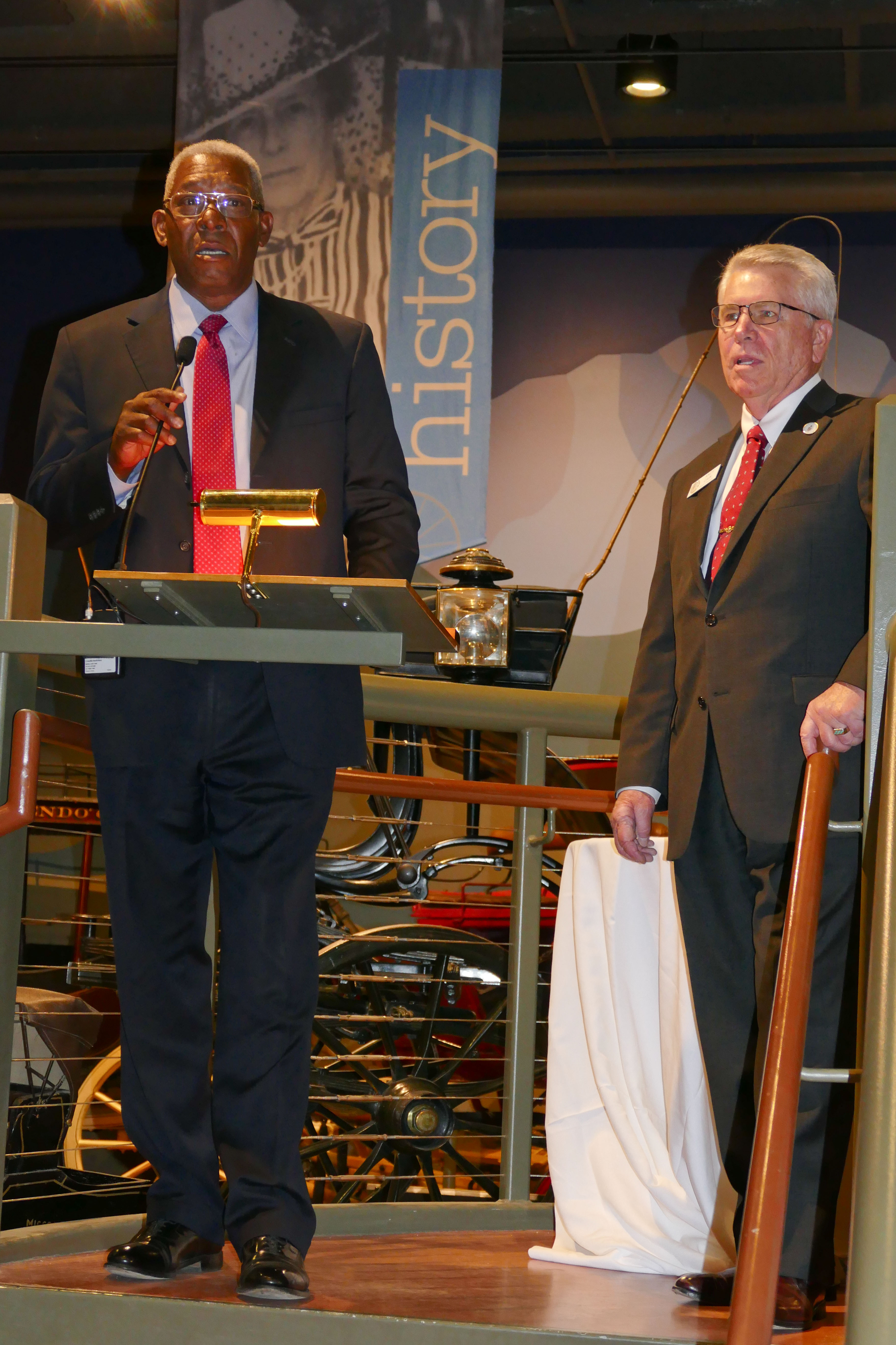 Terrance "Mac" McWilliams from the El Pomar Foundation, left, making ...
