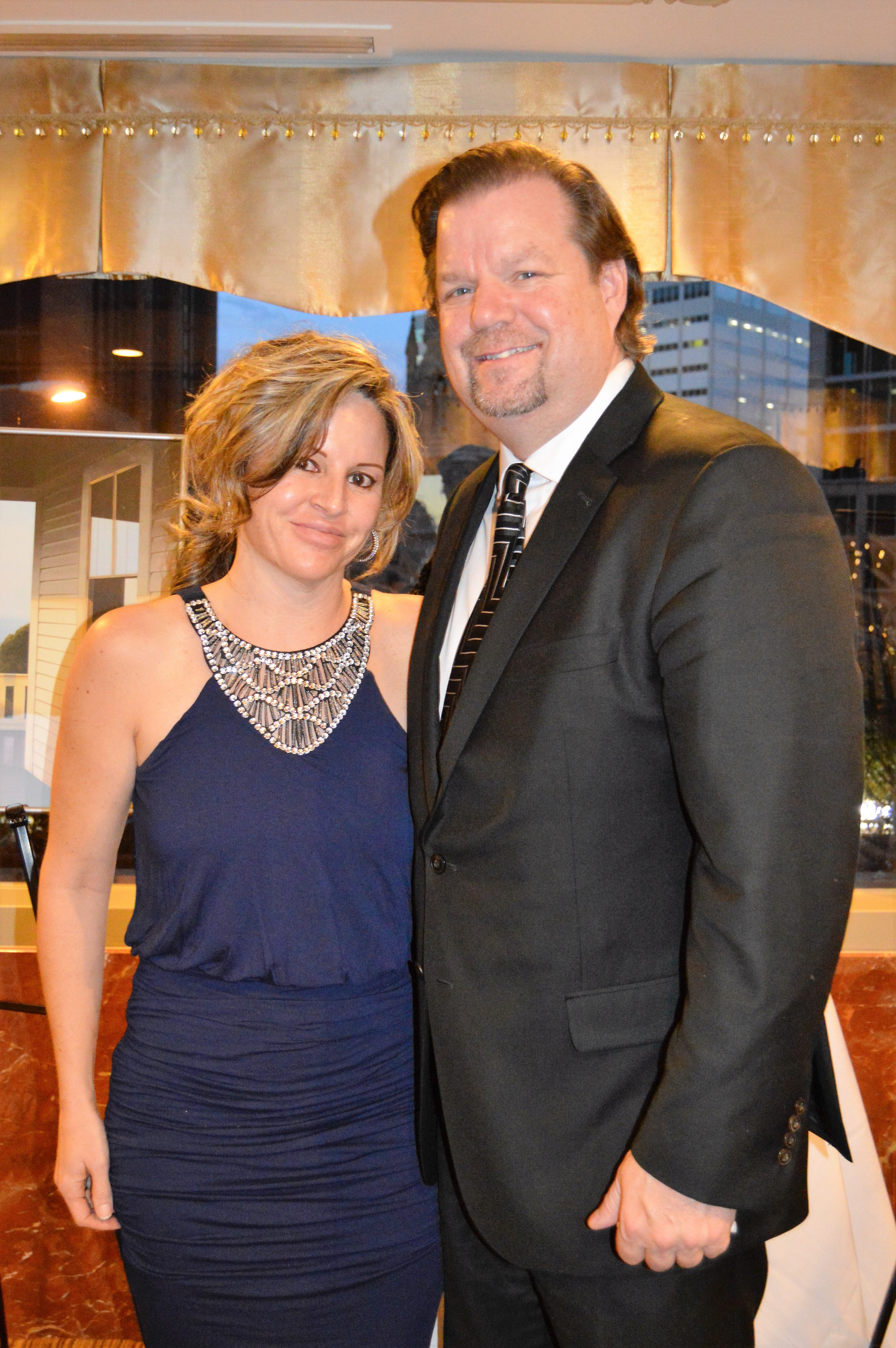 Sponsor Kelly Wells, of State Farm, with Dave Melling