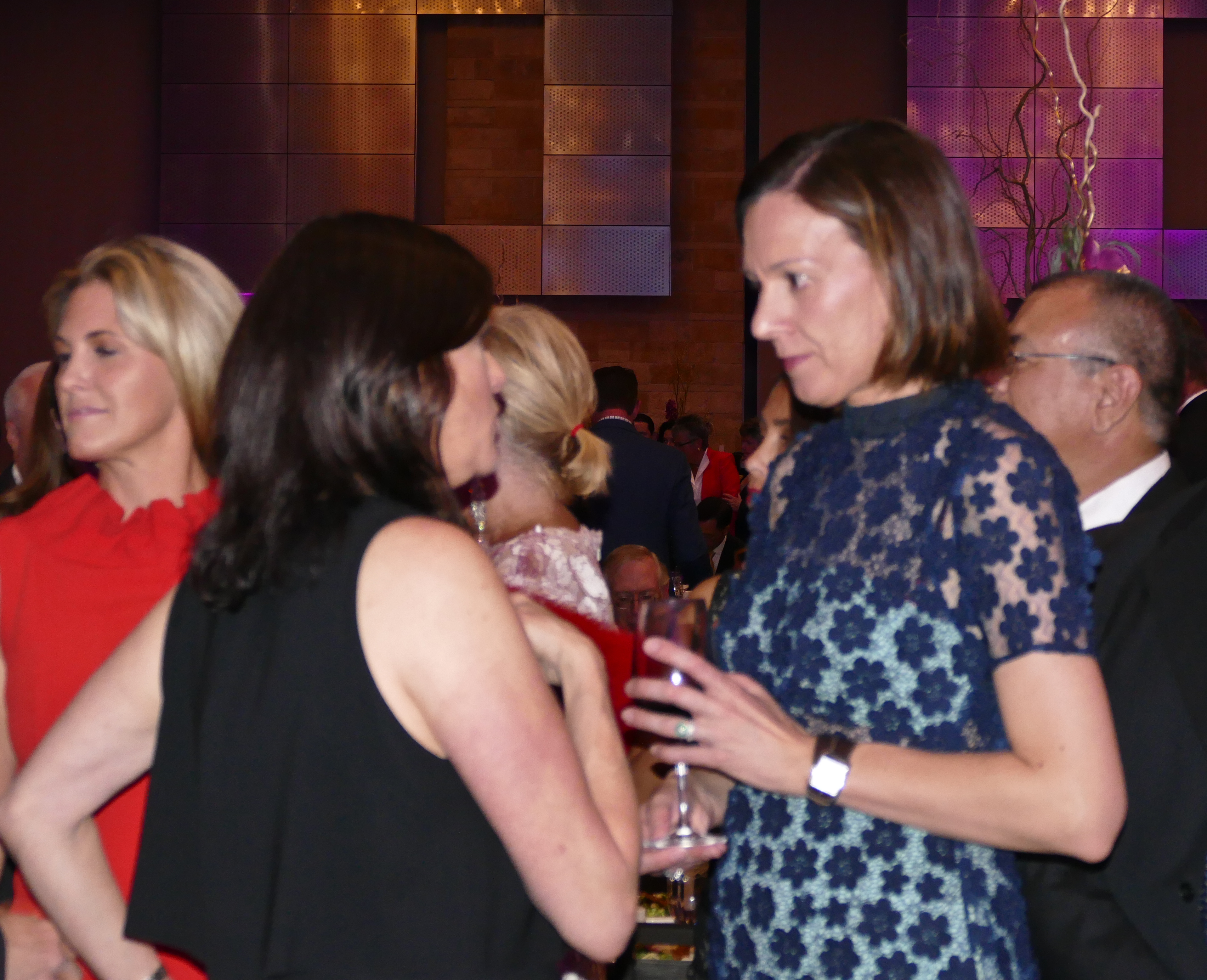 Dana Davis, left, chats with Robin Pringle Hickenlooper