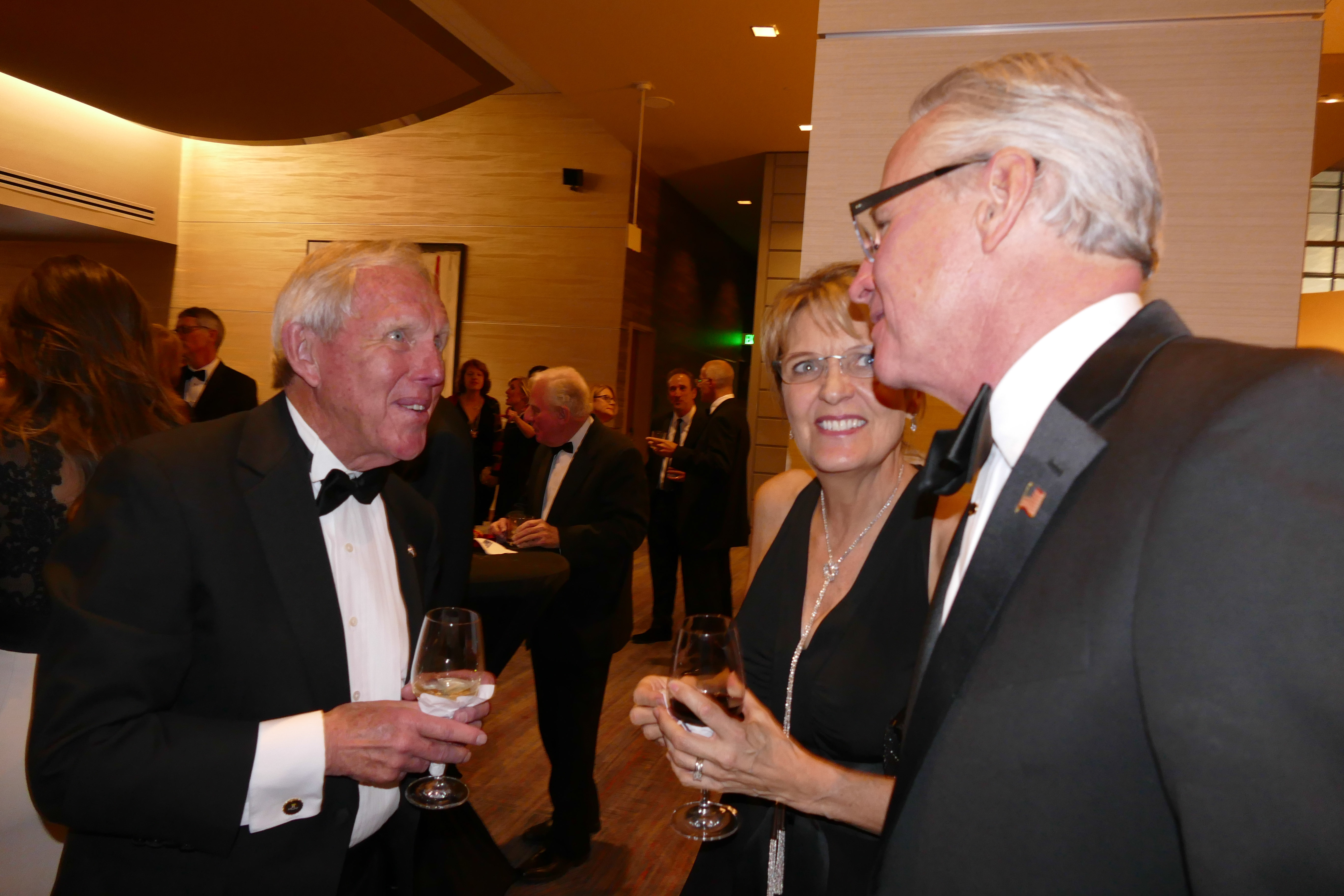 Honoree Joe Blake, left, greets Lisa and Norm Franke