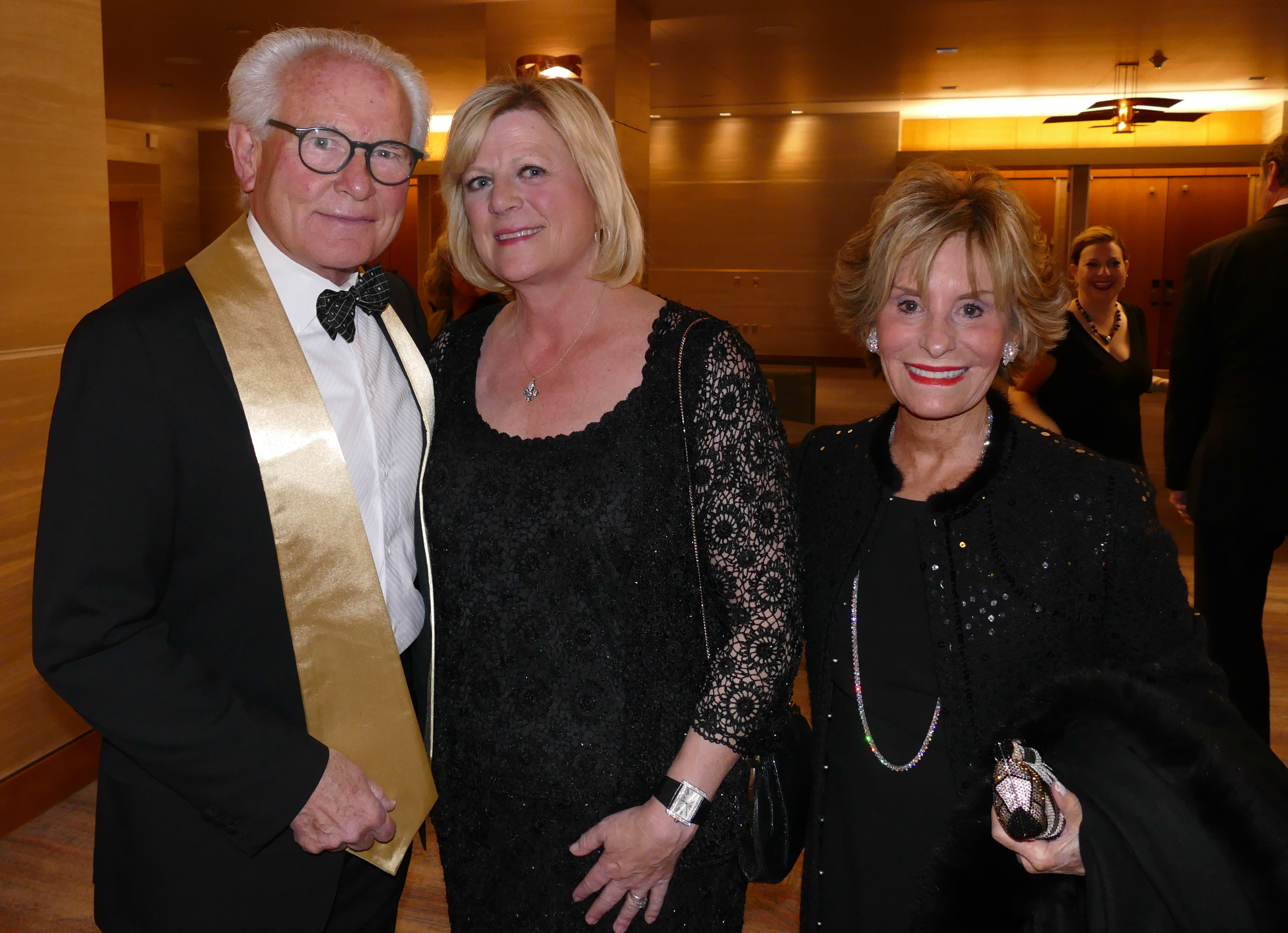 Barry Hirschfeld, left, Julie Mills, daughter of honoree, the late ...