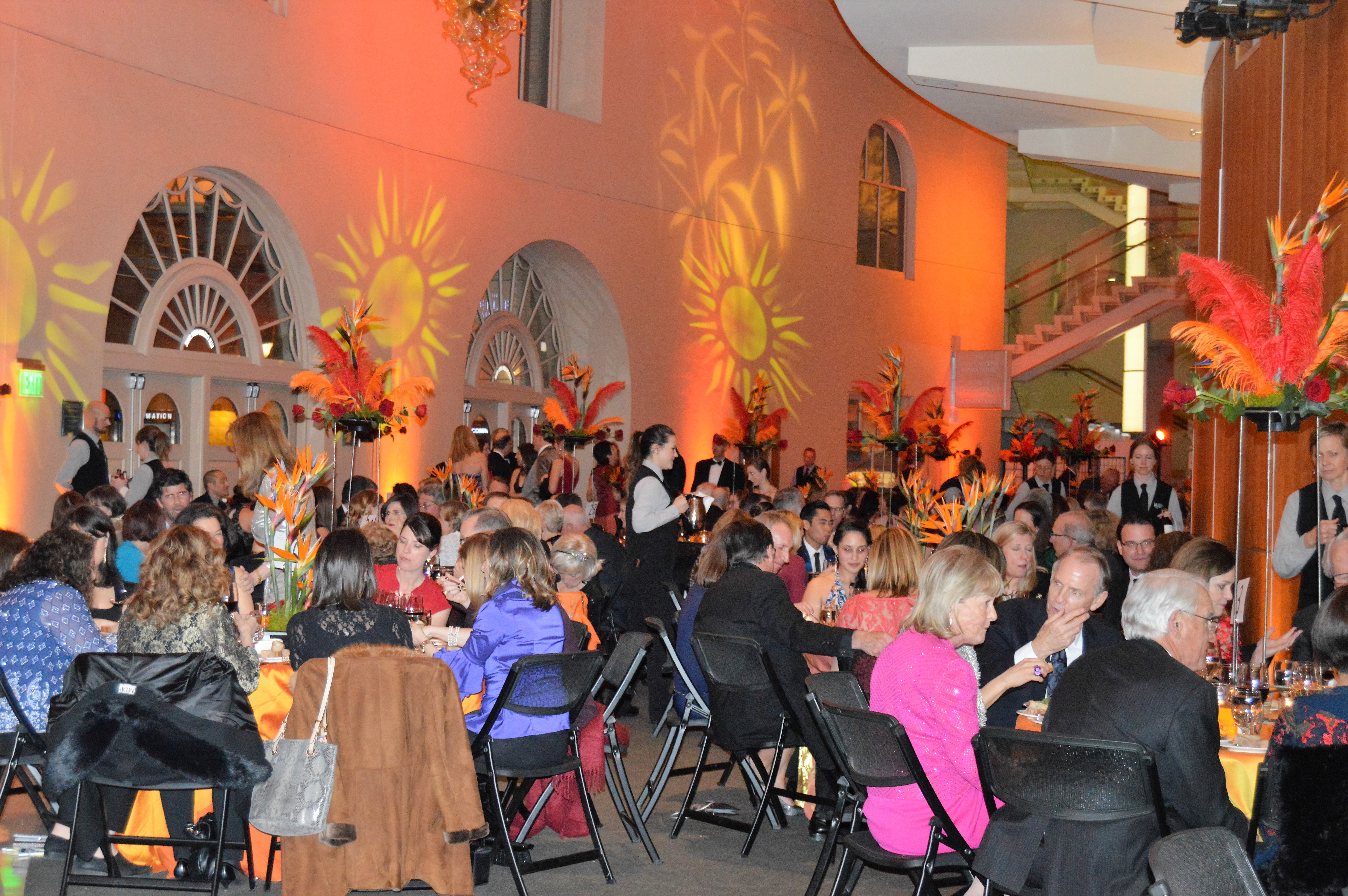 Guests sit down for a sumptuous dinner.