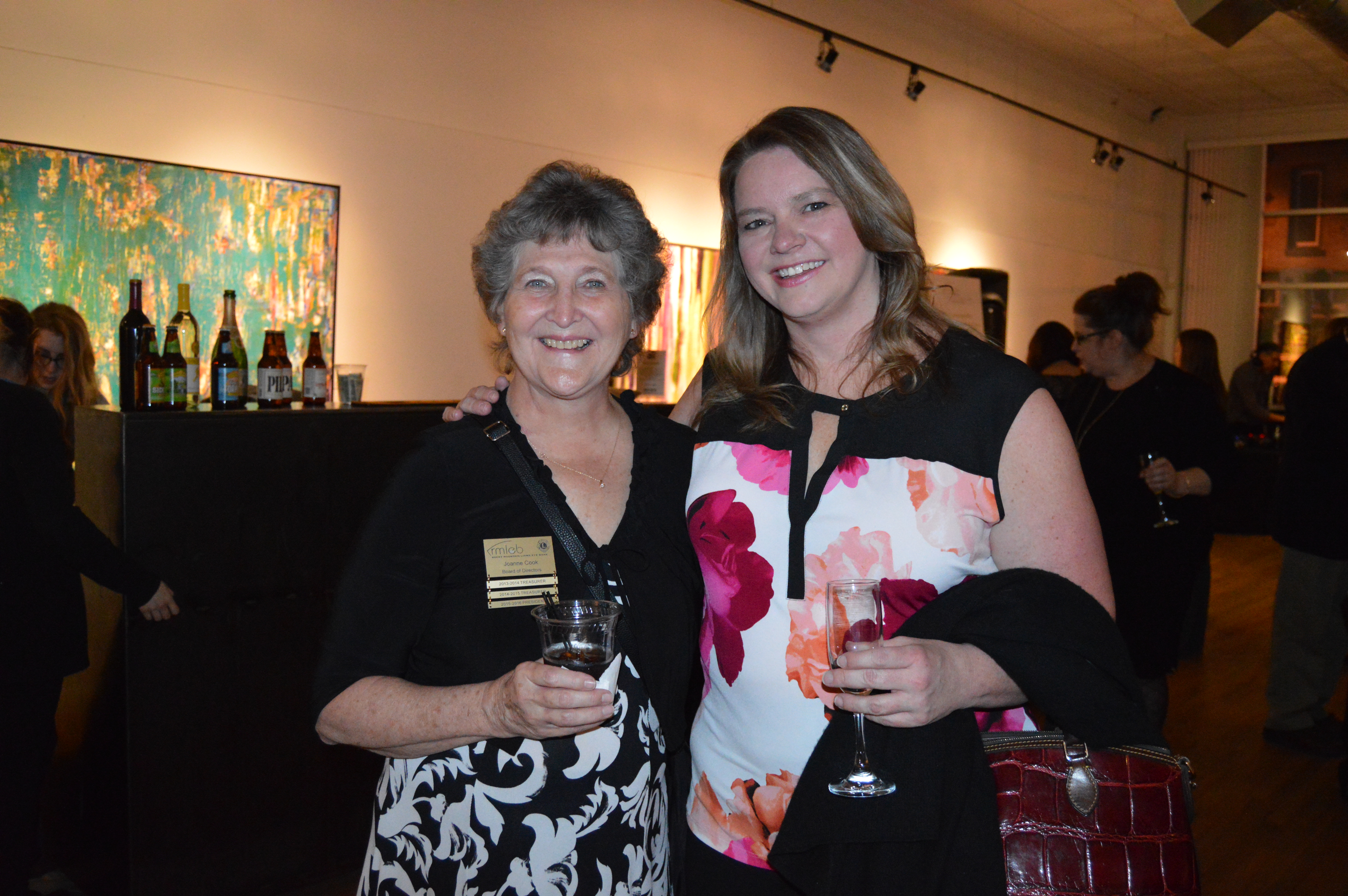 Board member Joanne Cook (left) and Lisa Isom