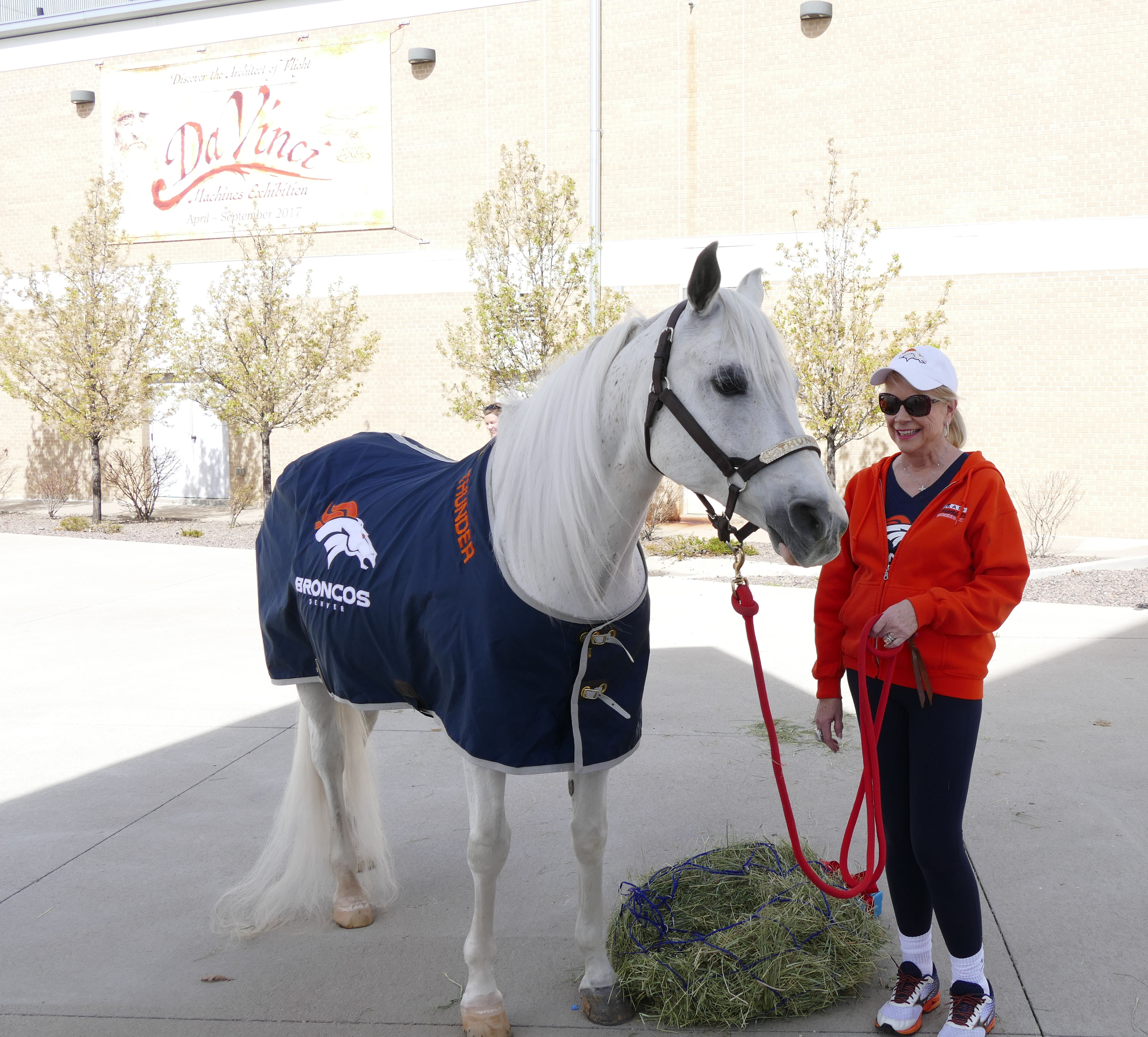 Thunder poses with owner Sharon Magness Blake
