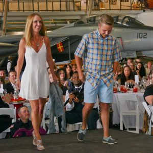 Tanner Feith and Keri Christiansen smile as Kim Christiansen talks ...